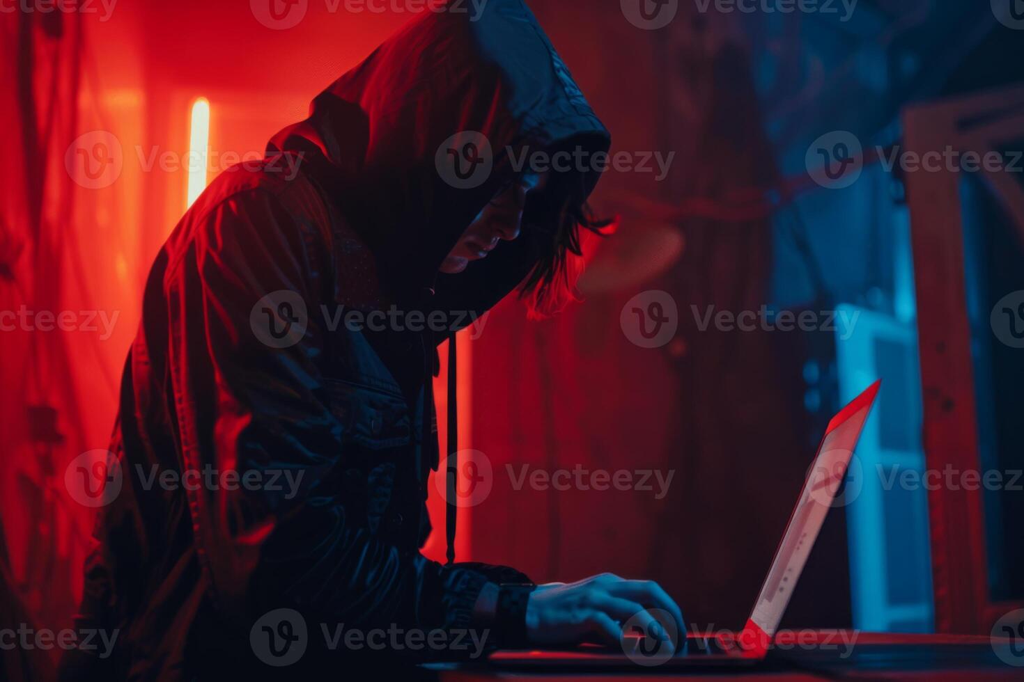 Hacker coding virus ransomware using laptop. Cyber attack, system breaking and malware concept ...