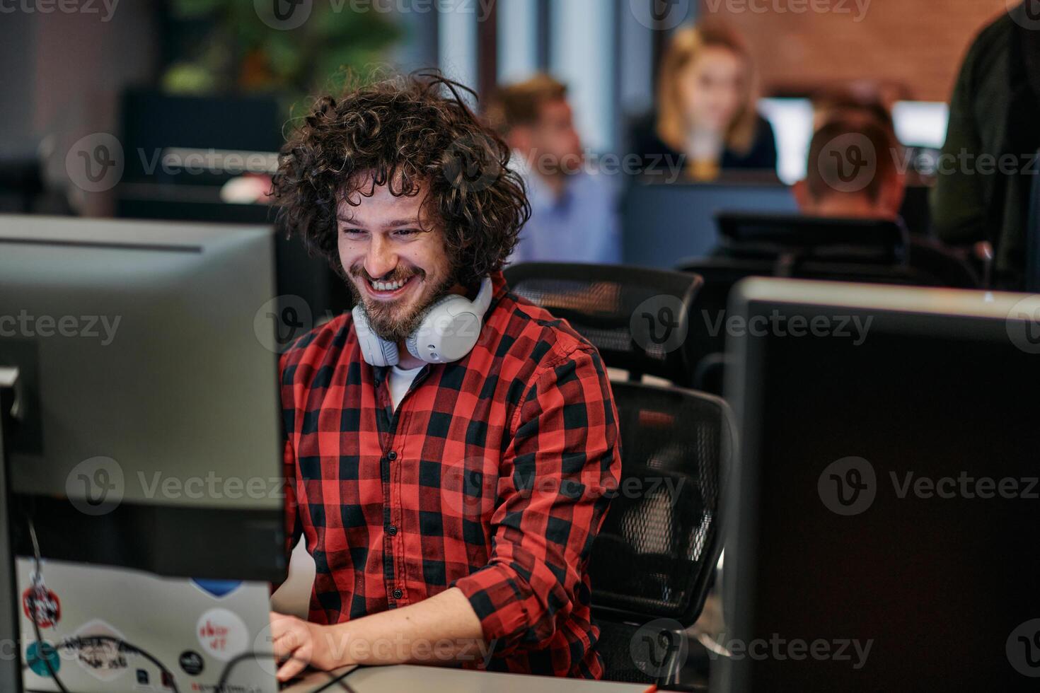Focused Programmer With Afro Hairstyle in Plaid Shirt Working on ...