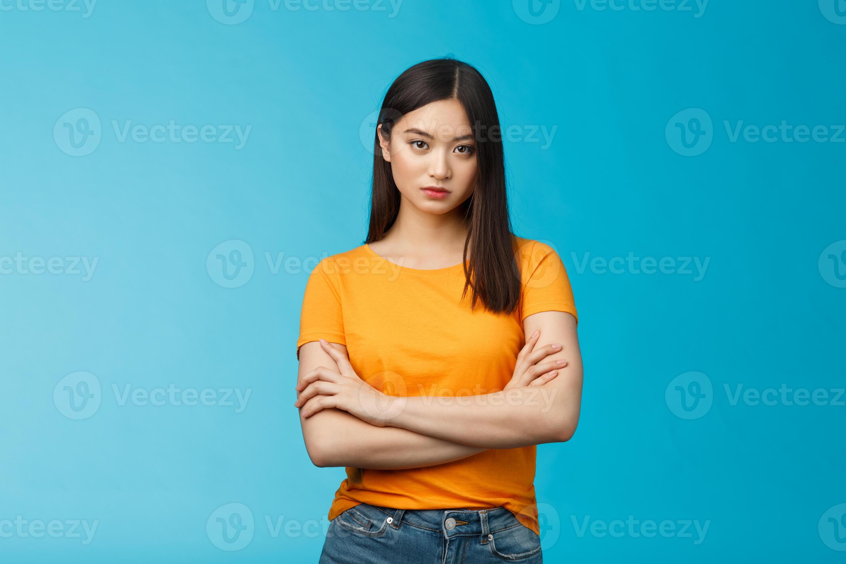 Serious-looking confident and arrogant asian woman cross hands chest ...