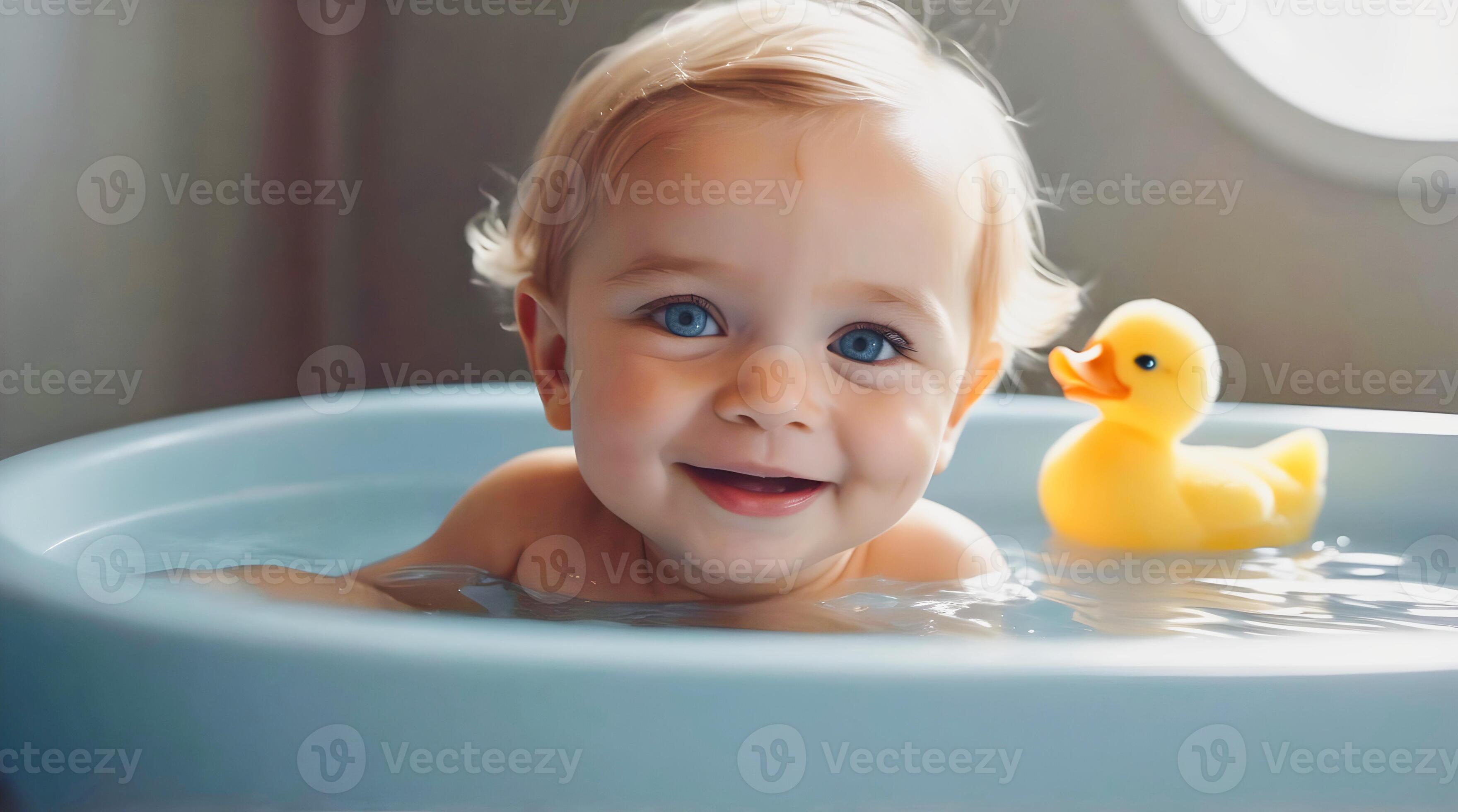 Cute little baby in bathtub playing with yellow duck toys, toddler with ... Cute little baby in bathtub playing with yellow duck toys, toddler with ...