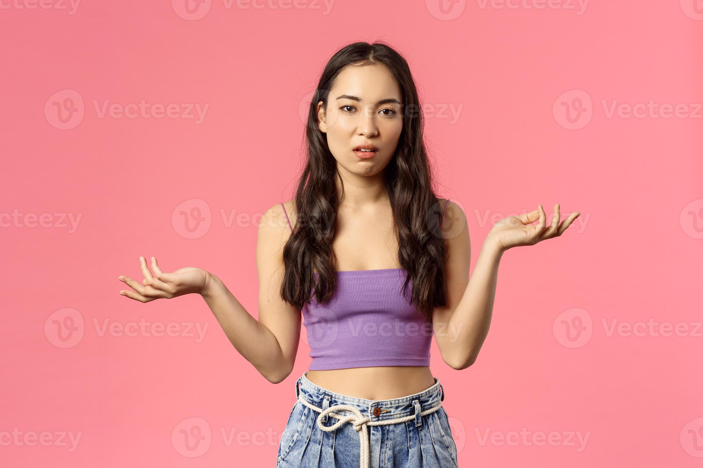 So what. Portrait of careless arrogant stylish asian girl shrugging ...