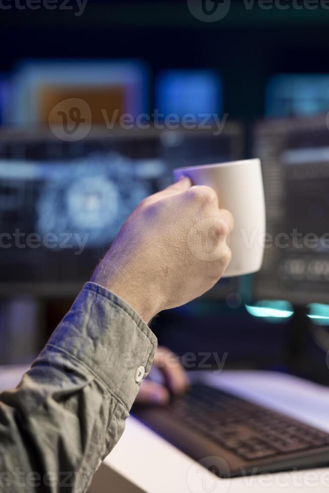 Man Drinking Coffee And Updating Artificial Intelligence Neural Networks Writing Binary Code
