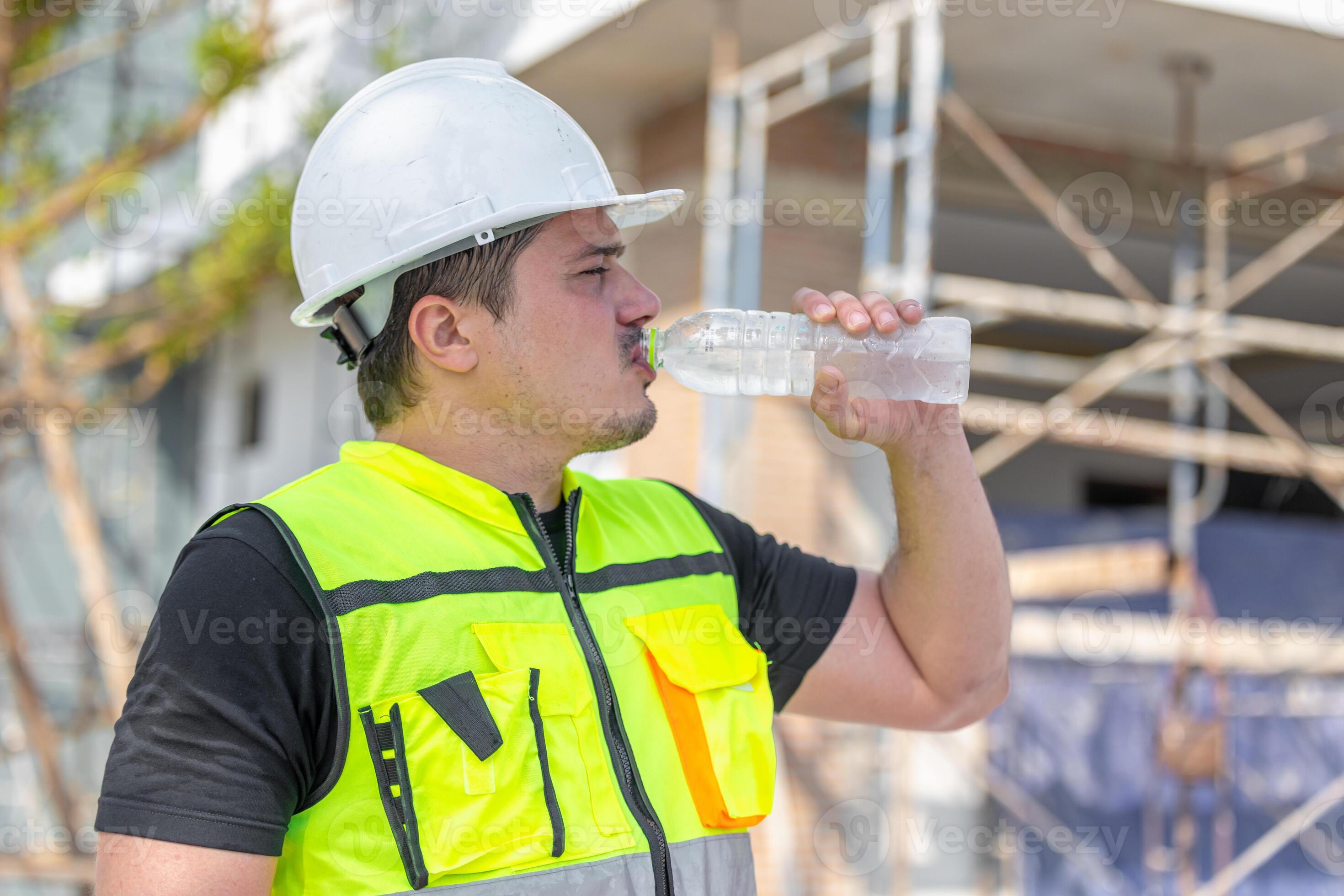 Hot Tired Thirsty Construction Worker Drinking Water on the Job Site 48785863 Stock Photo at ...