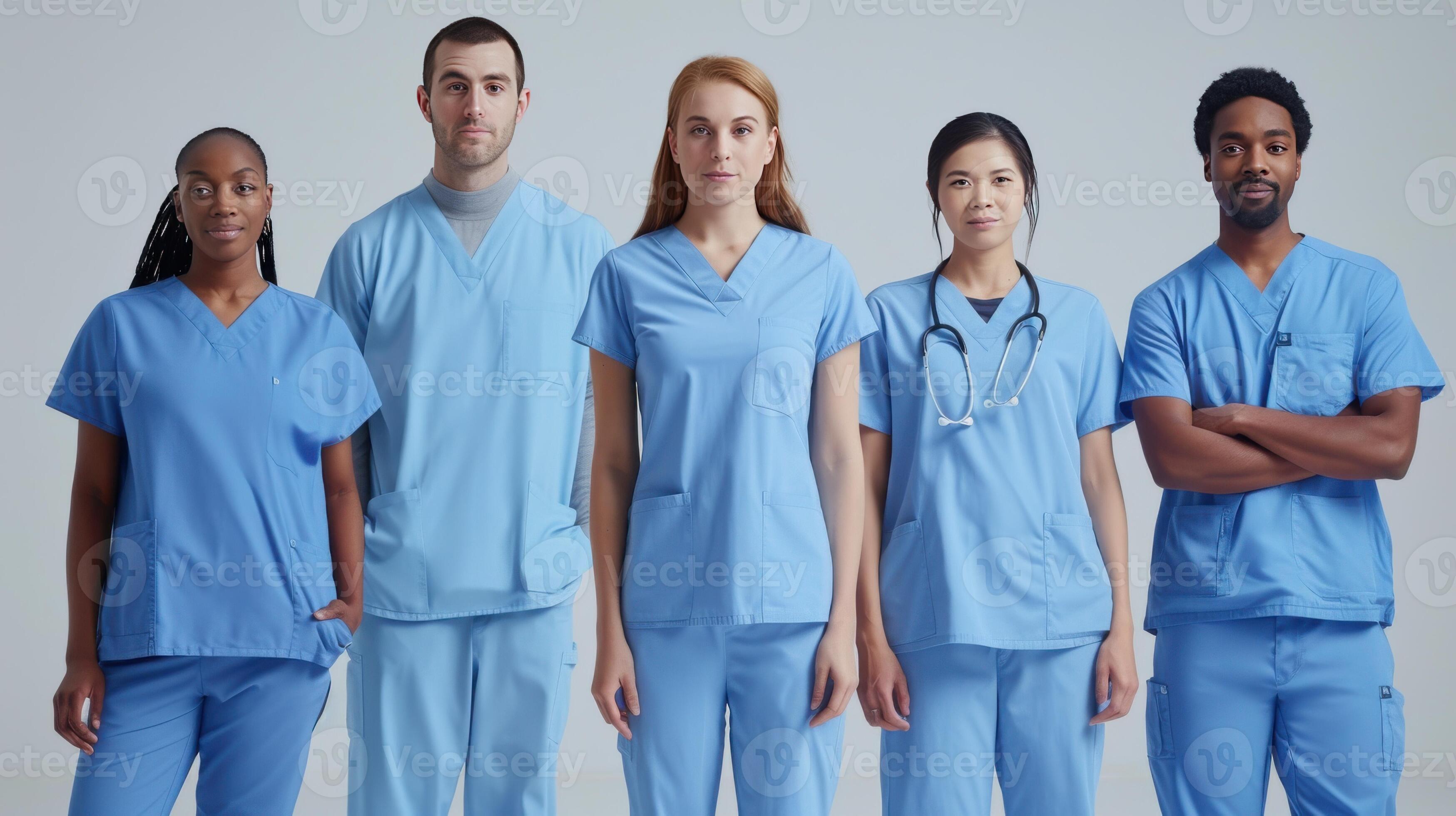 Diverse Group of Healthcare Professionals in Scrubs Standing Together in Bright Clinical Setting ...