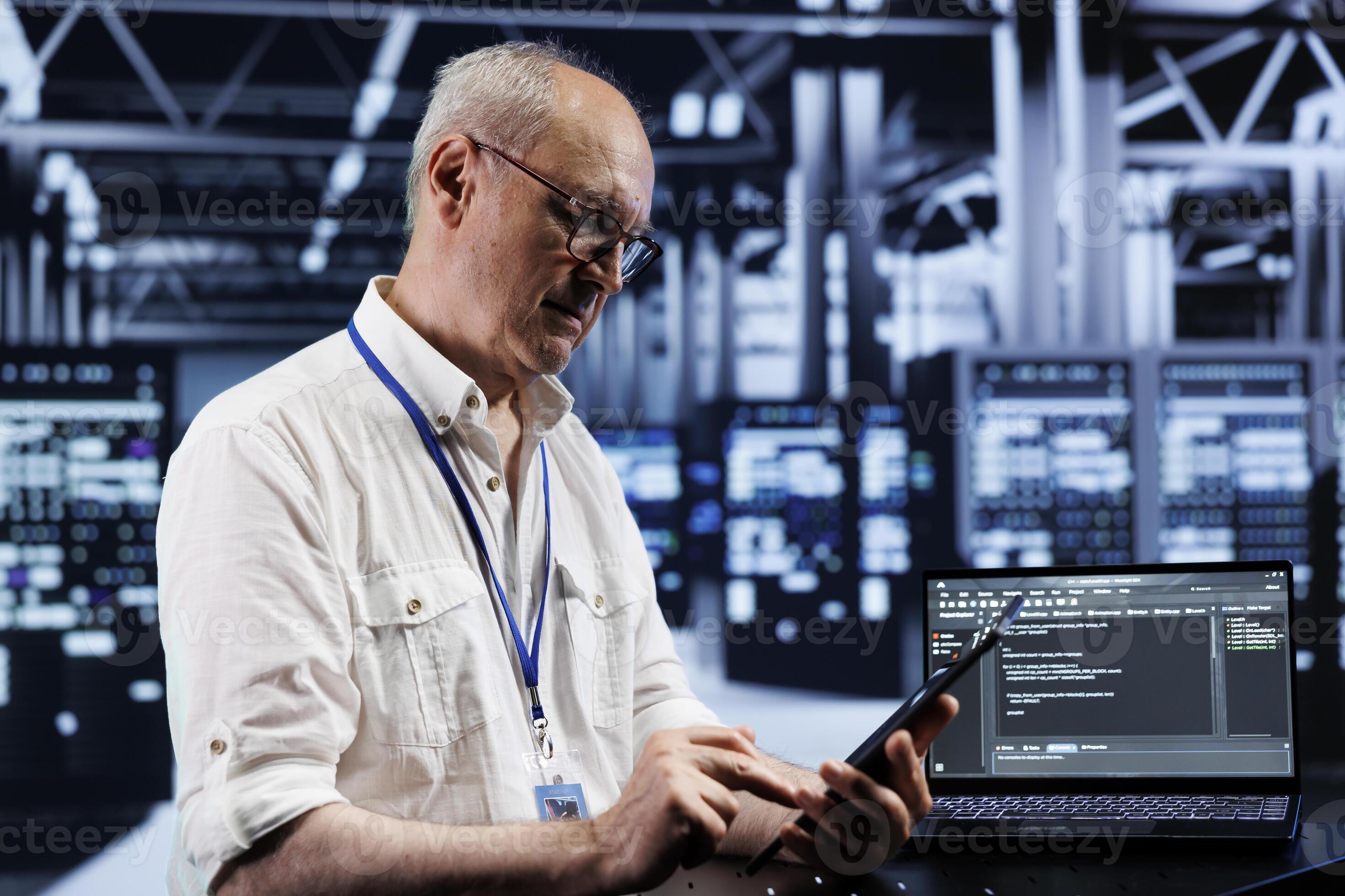 Elderly Technician Coding In High Tech Data Center Using Javascript
