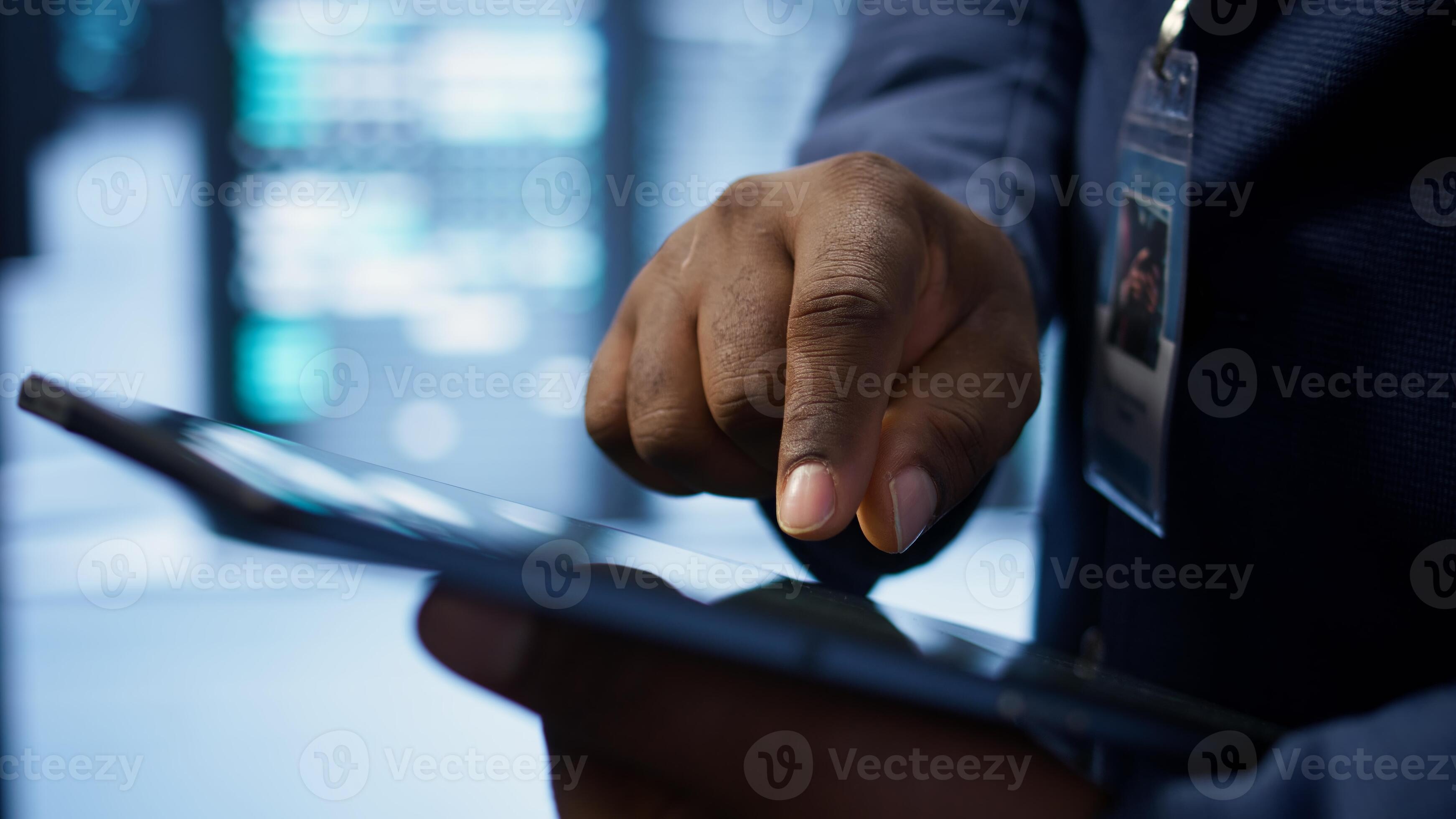 Technician In Server Hub Checking Recovery Plan On Tablet Monitoring