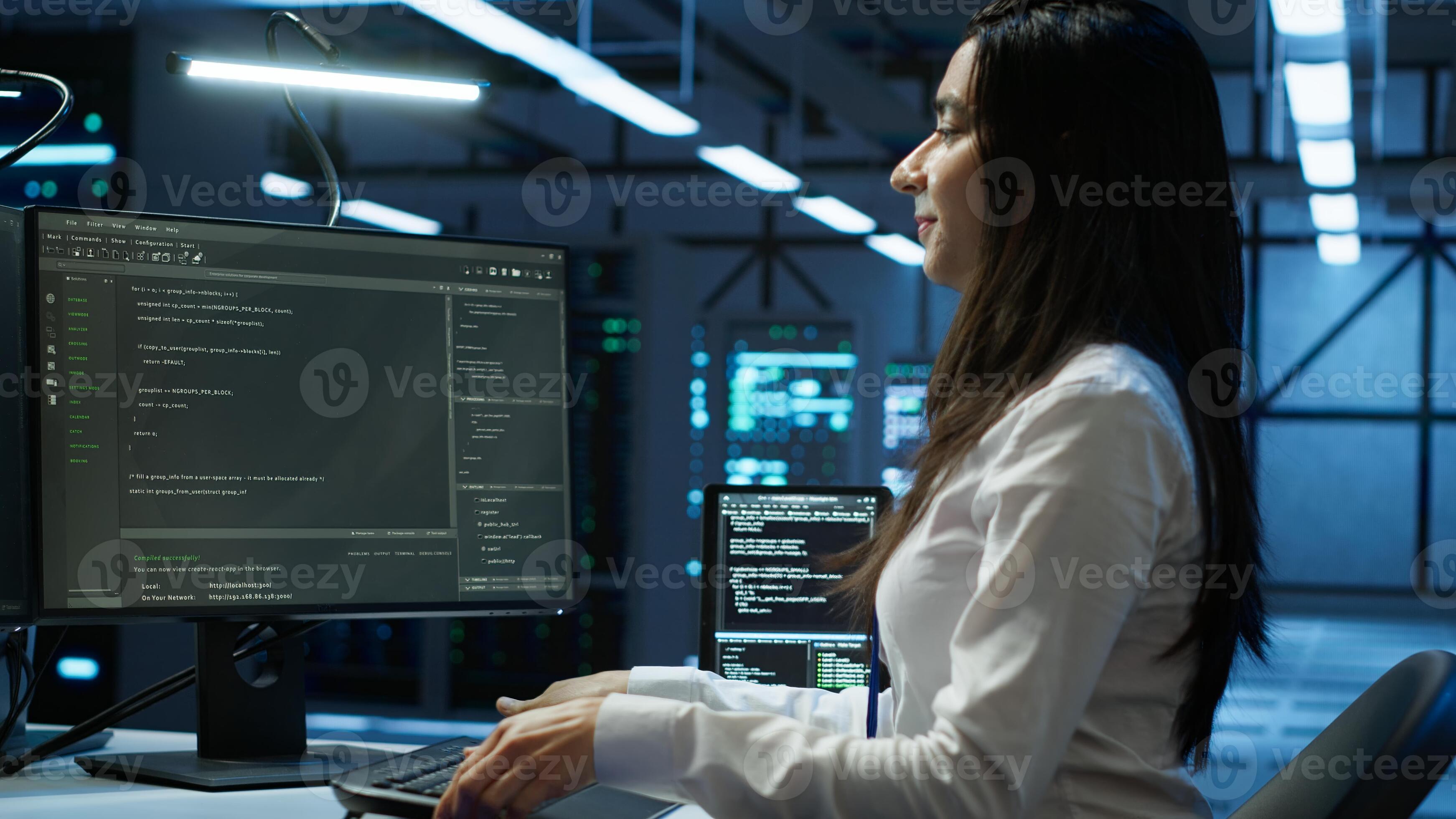Programmer in data center arriving in office, being tasked with ensuring system can handle ...
