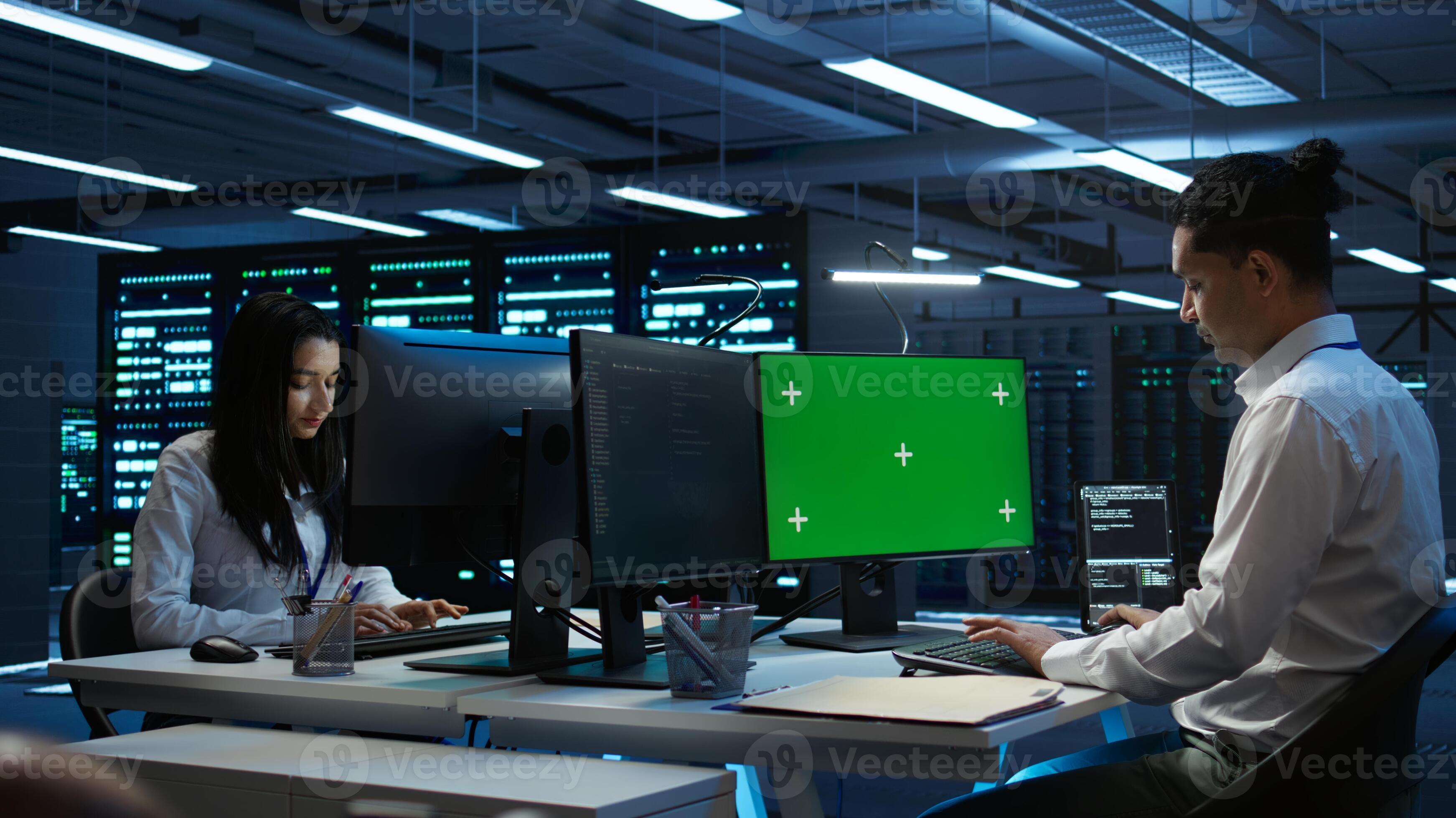 Programmer Overseeing Data Center Using Isolated Screen Computer Ensuring System Can Handle