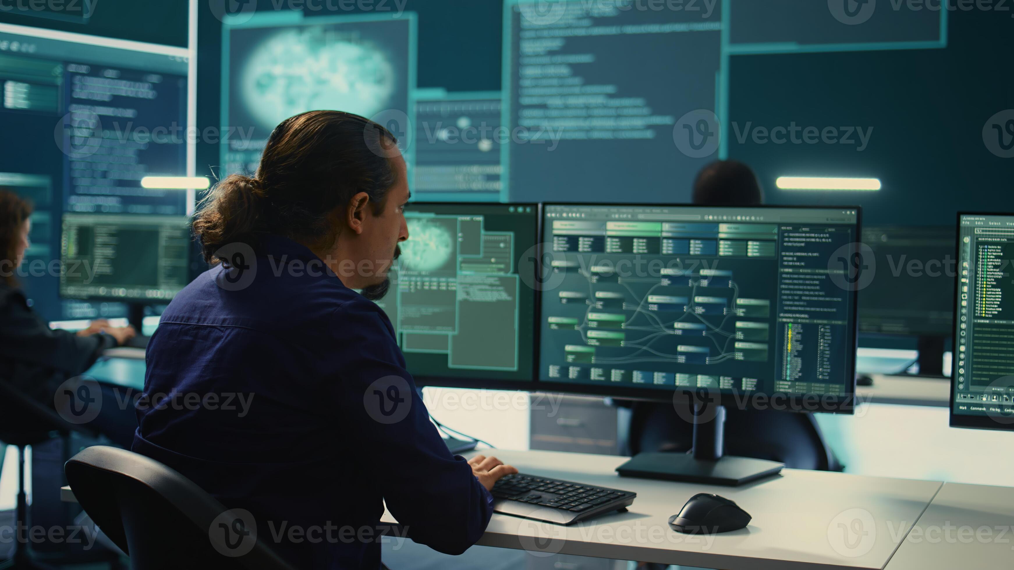 Governmental It Expert Monitoring Cyber Threats On A Computer And Big