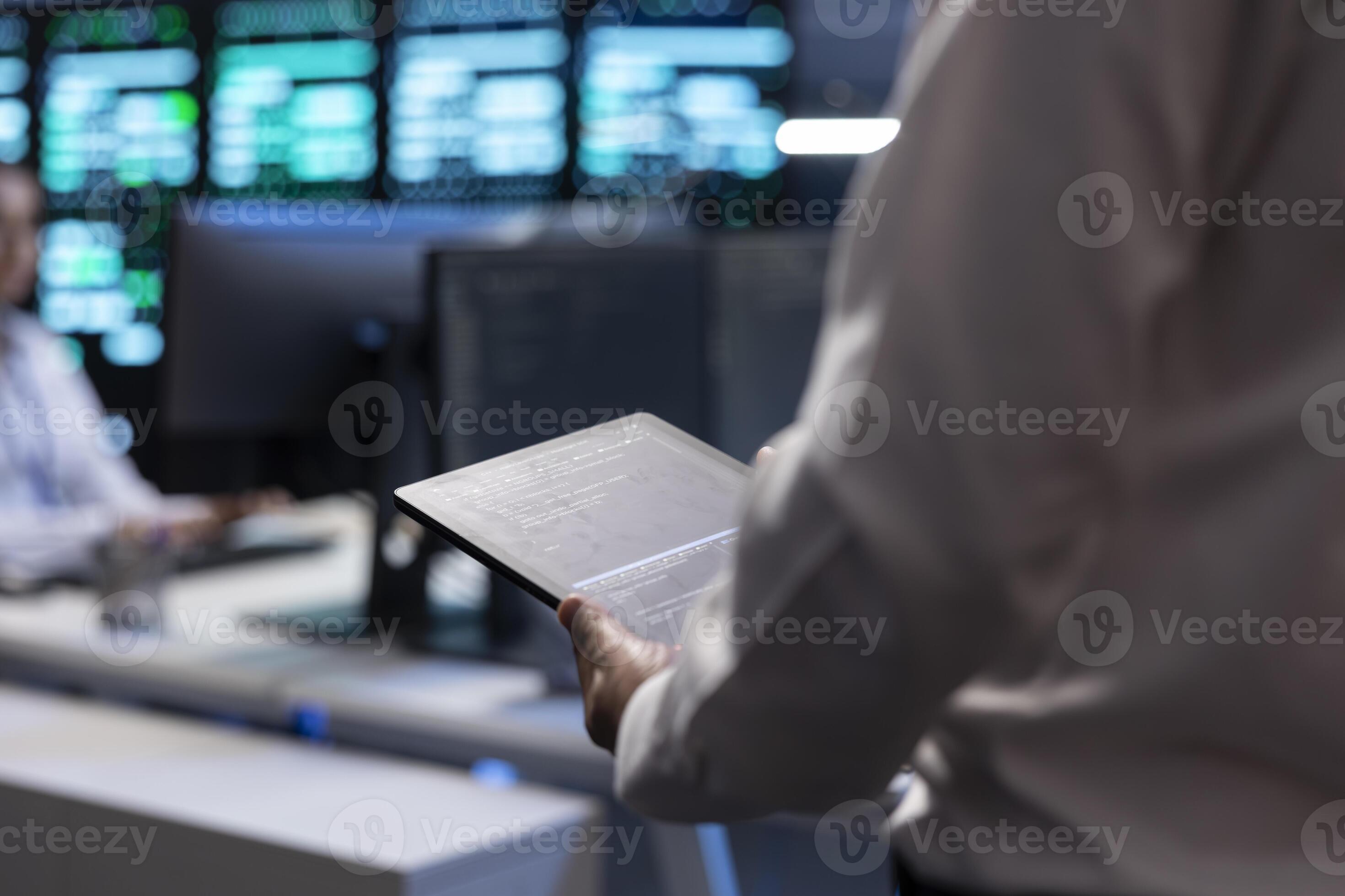 Admin doing yearly checkup to prolong data center electronics life span and avoid downtime ...