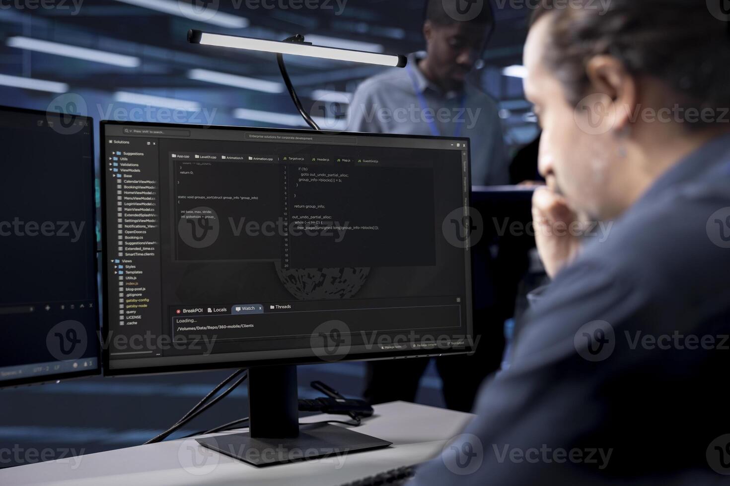 It Specialist Reconfiguring Server Room To Optimize It For Data