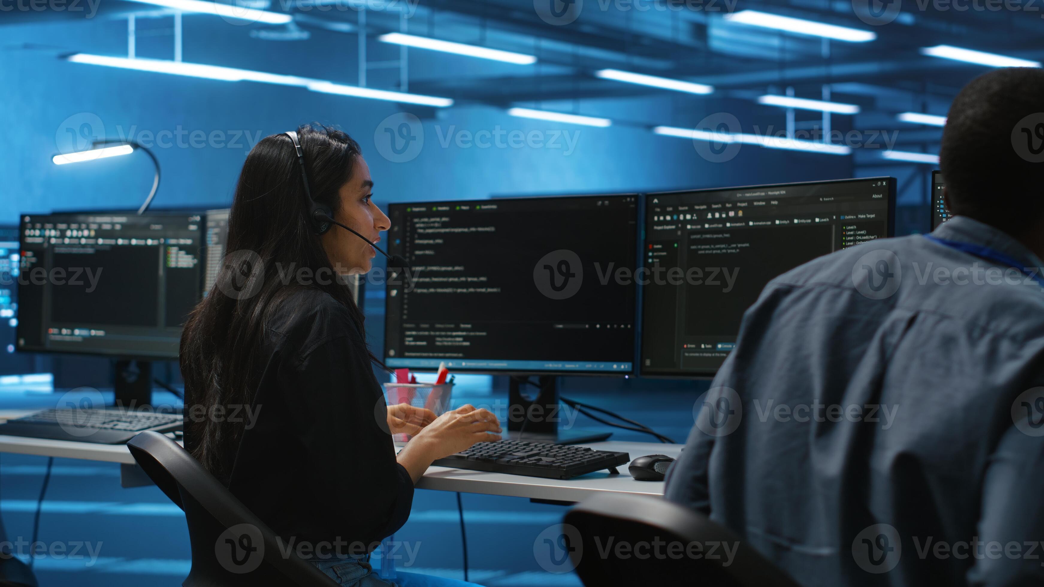 Team Of It Support Experts Working Together Supervising Server Rows In