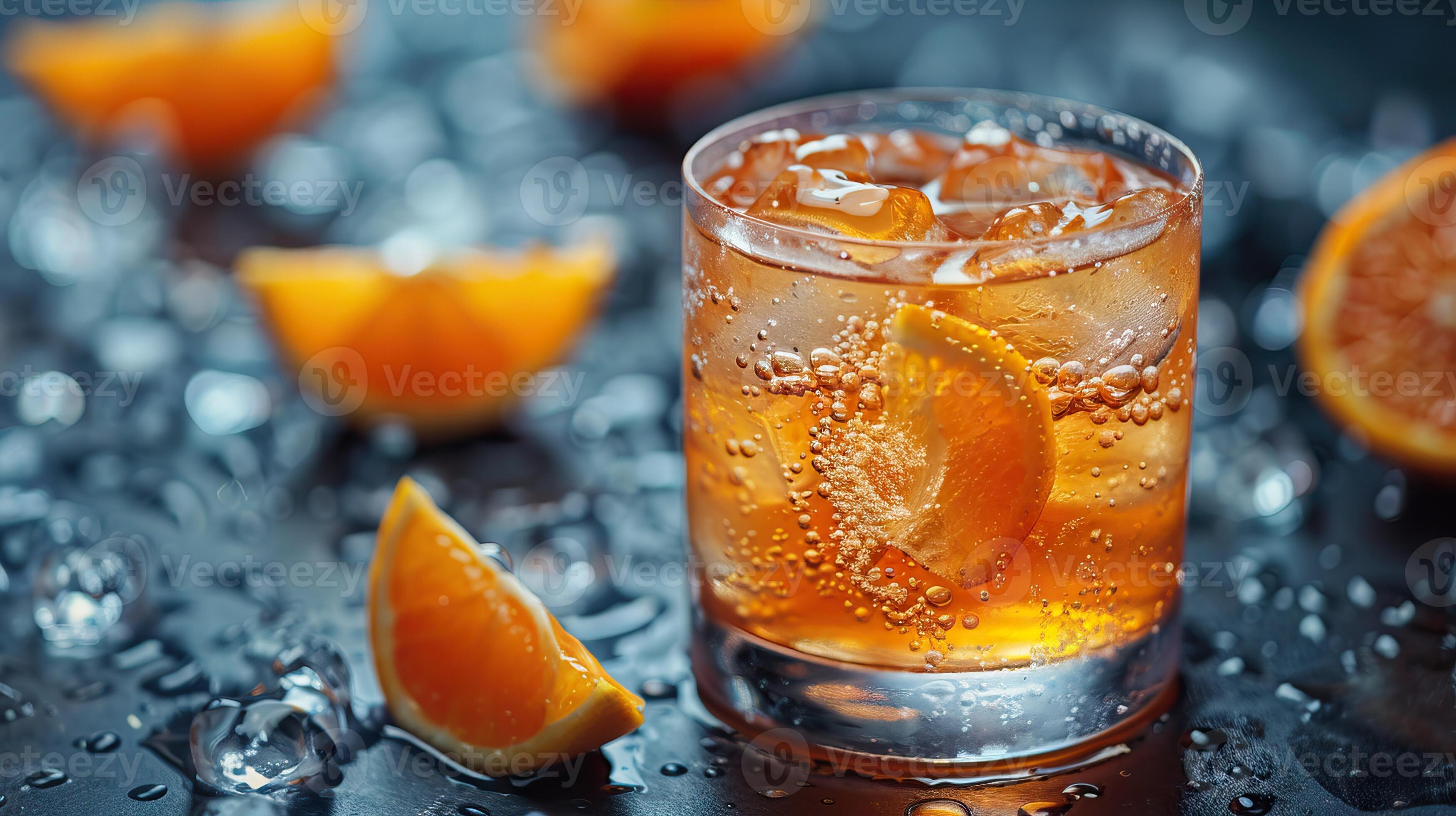 Refreshing orange cocktail with ice cubes and orange slices. 49110022 Stock Photo at Vecteezy