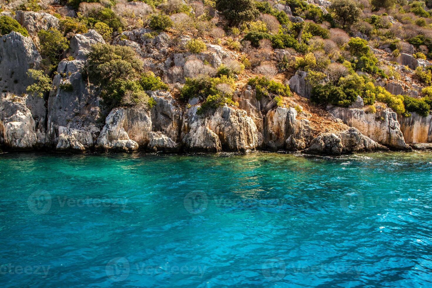 Rocky coast and azure sea water. Bright natural background. 49336620 ... Rocky coast and azure sea water. Bright natural background. 49336620 ...