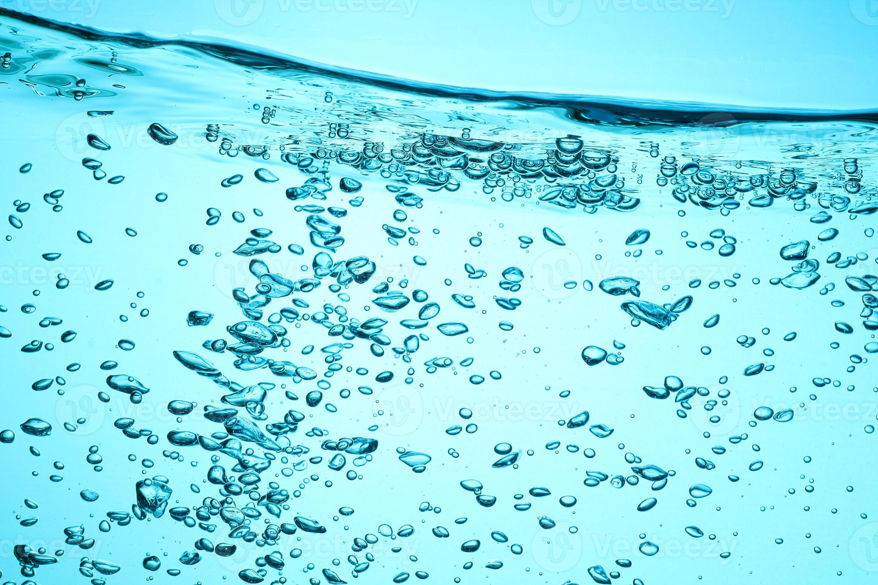 Fresh Water With Underwater Bubbles Texture on a Blue Background Close-up Abstract Liquid ...