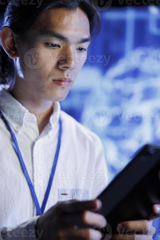 Computer Scientist Using Tablet In Data Center To Maintenance Artificial Intelligence Neural