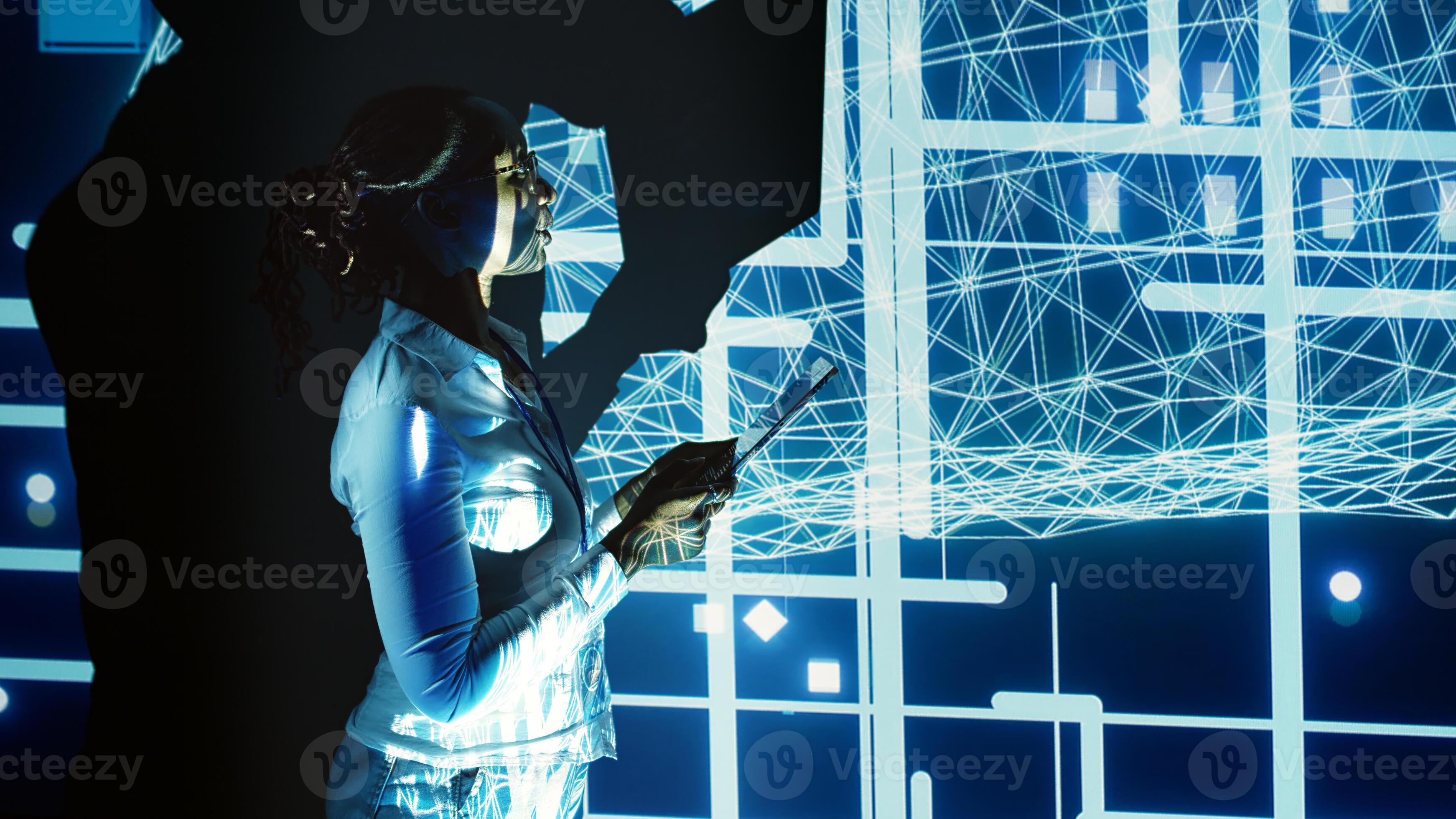 Experienced technician programming in AI server farm housing advanced ...