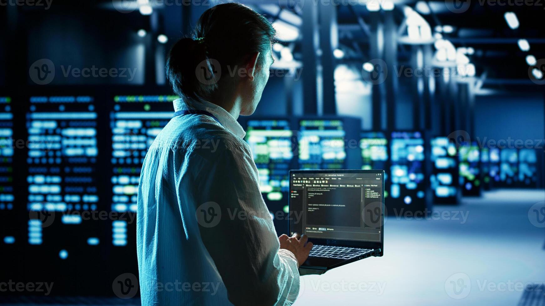 Qualified It Developer Running Code On Laptop Troubleshooting And Upgrading Data Center