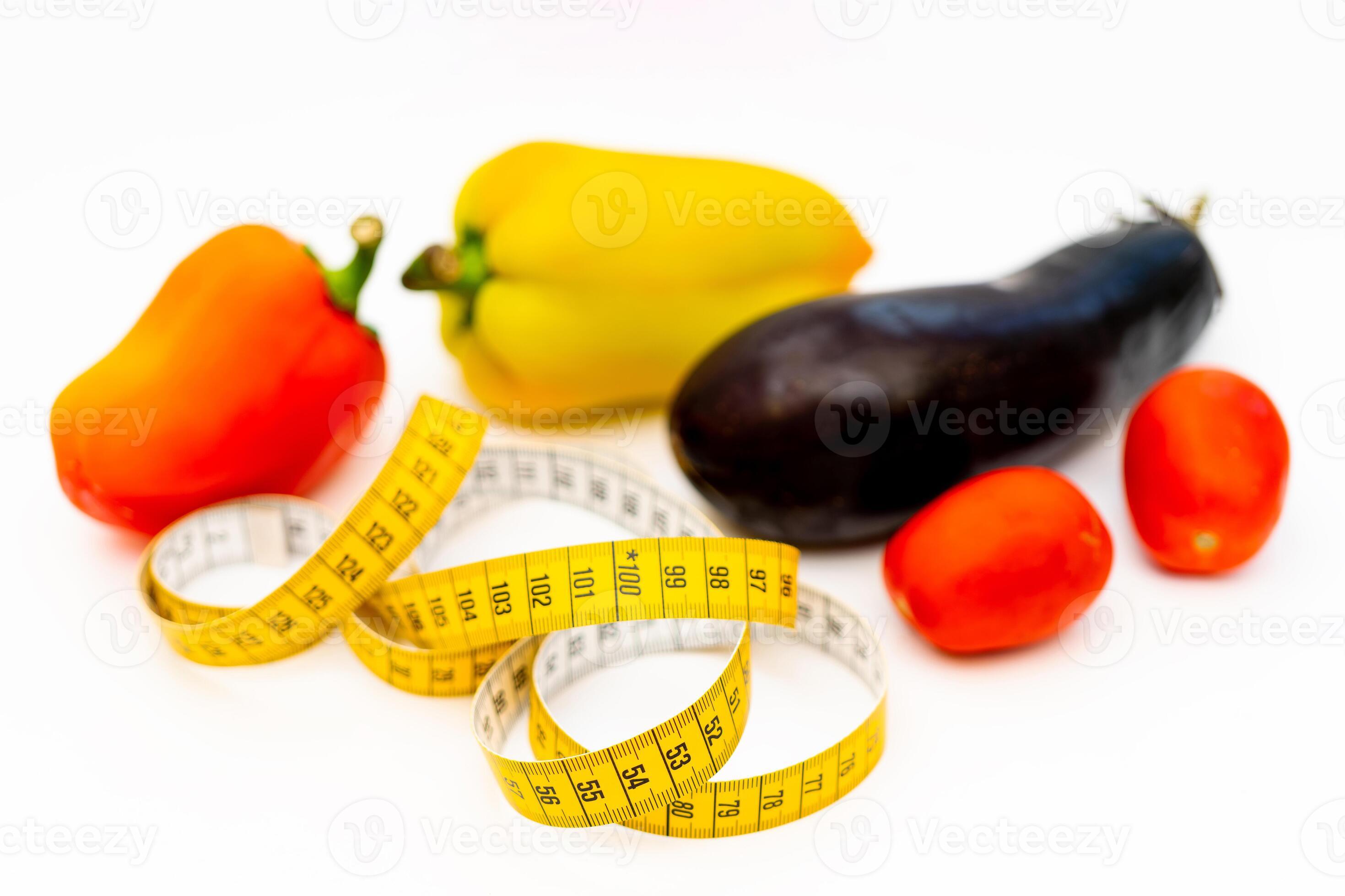 Yellow measuring tape. Fresh vegetables for healthy lifestyle diet food. 49542496 Stock Photo at ...