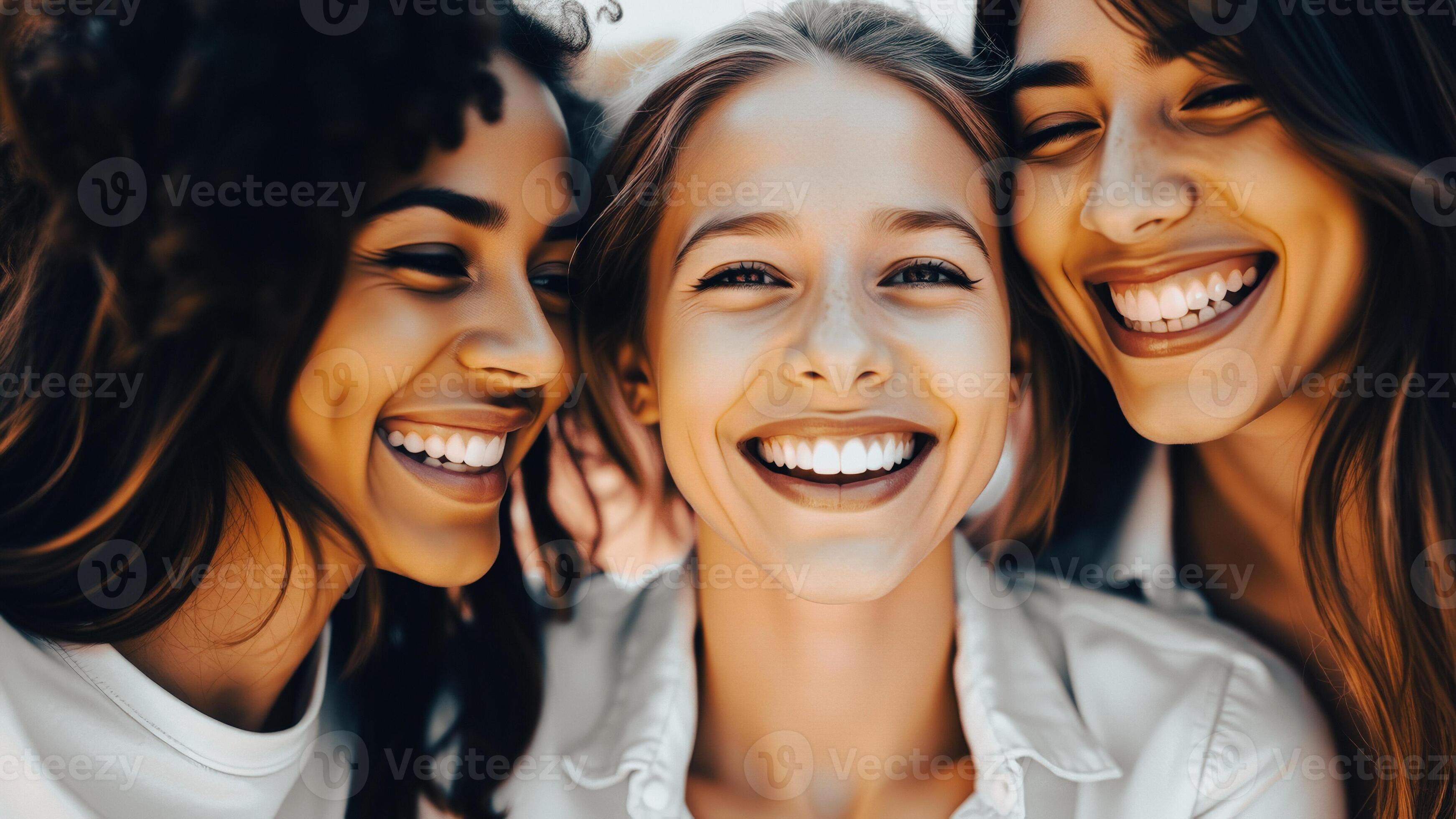 Three Young Women Smiling Close Up 49685778 Stock Photo at Vecteezy