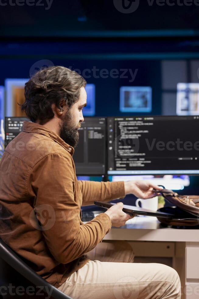 Man Packing Laptop After Finishing Doing Software Quality Assurance And Reading Source Code
