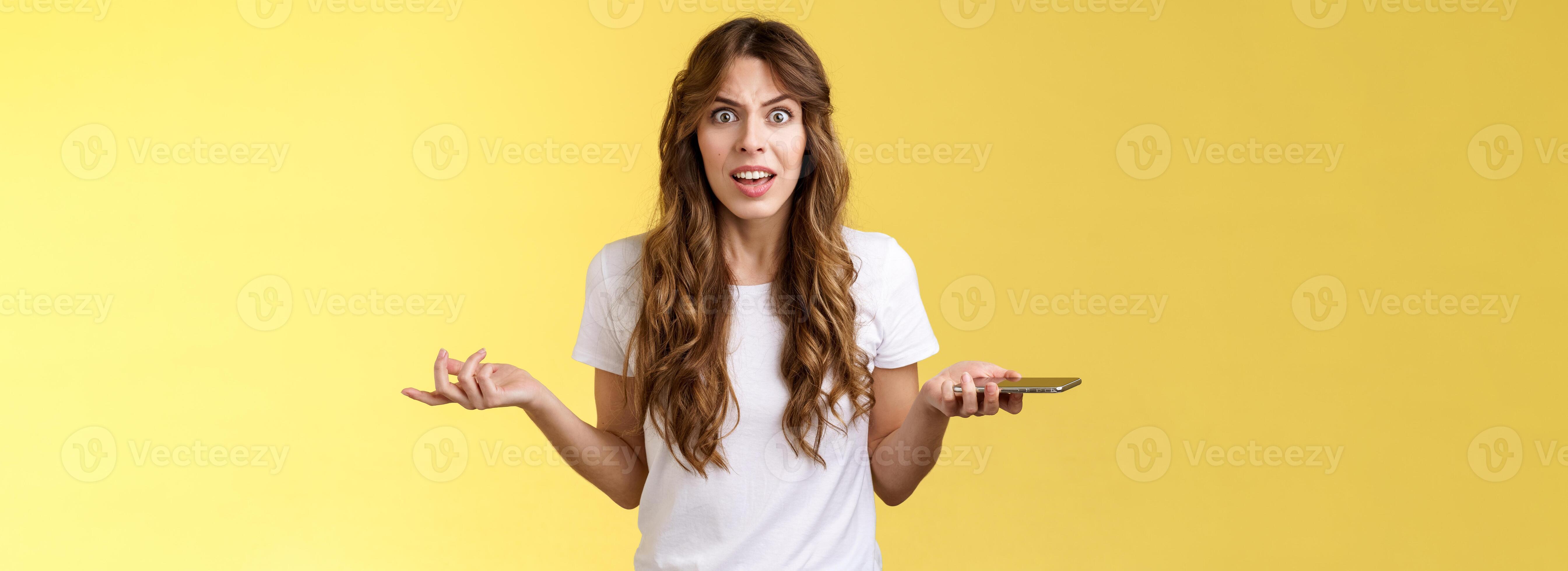 Pissed frustrated bothered curly-haired caucasian girl stare camera ...