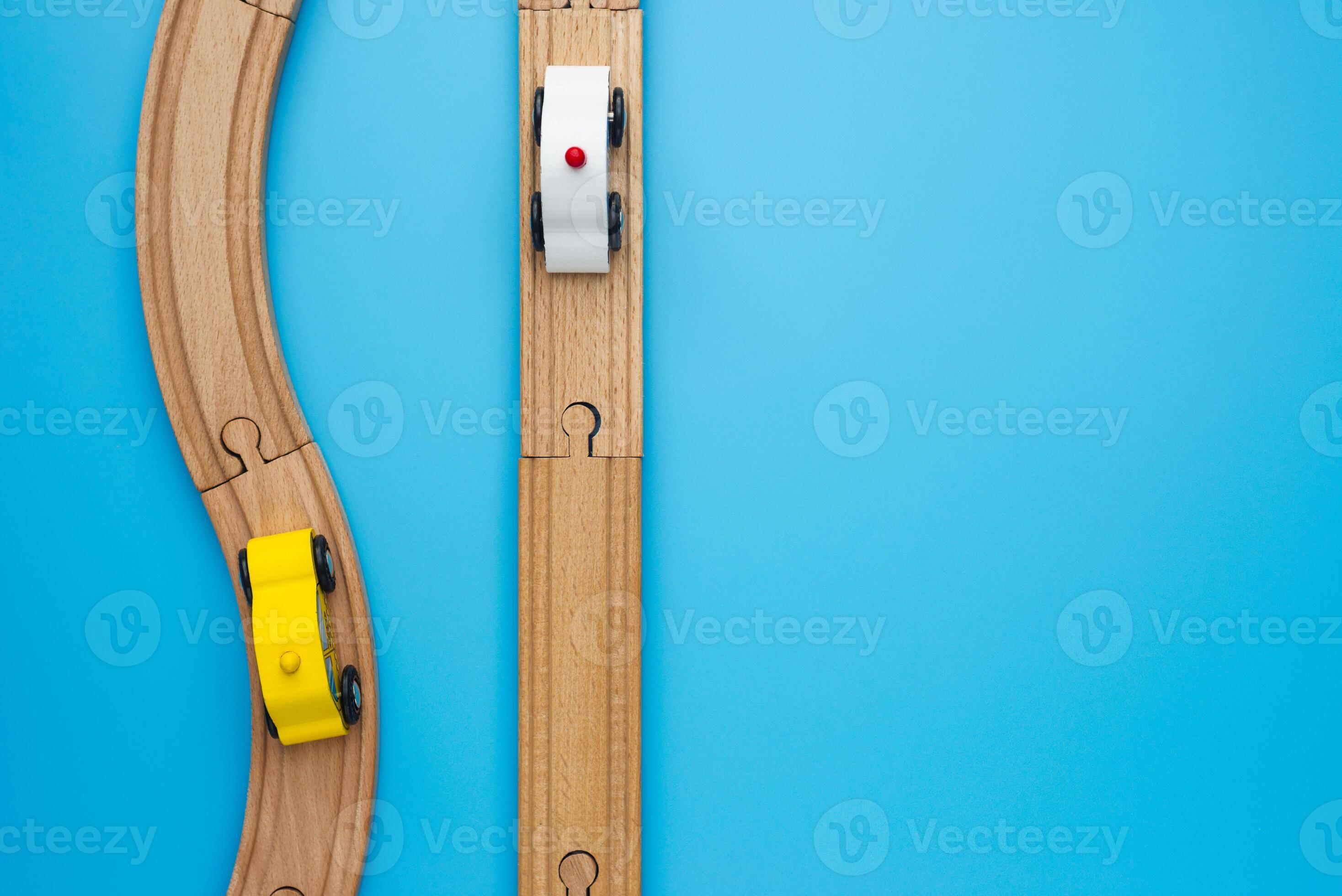 Baby kid toys background. Toy train and wooden rails on blue background 49991455 Stock Photo at ...