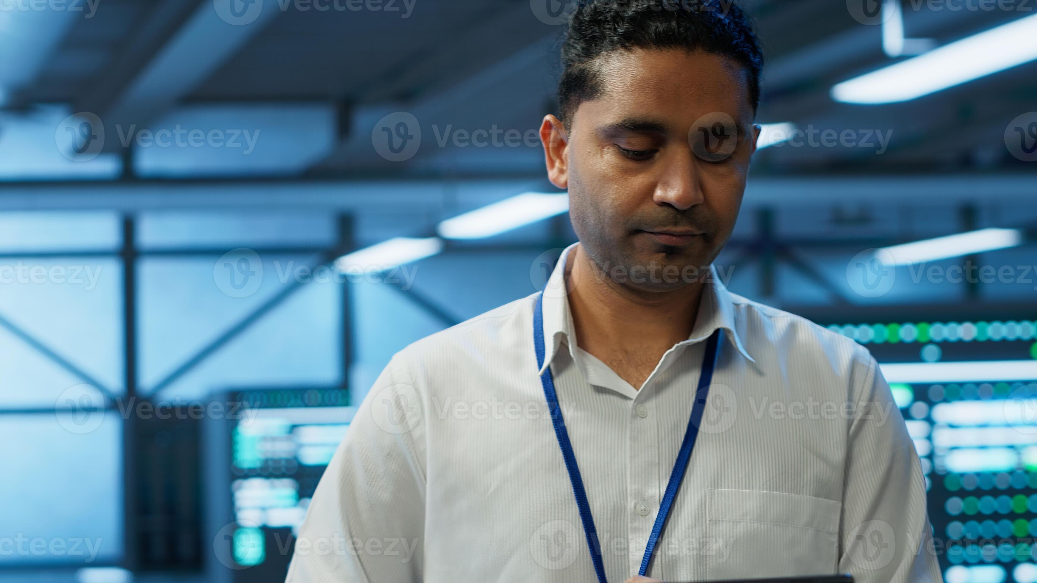 Engineer Walking In Data Center Monitoring Security Threats Implementing Cybersecurity