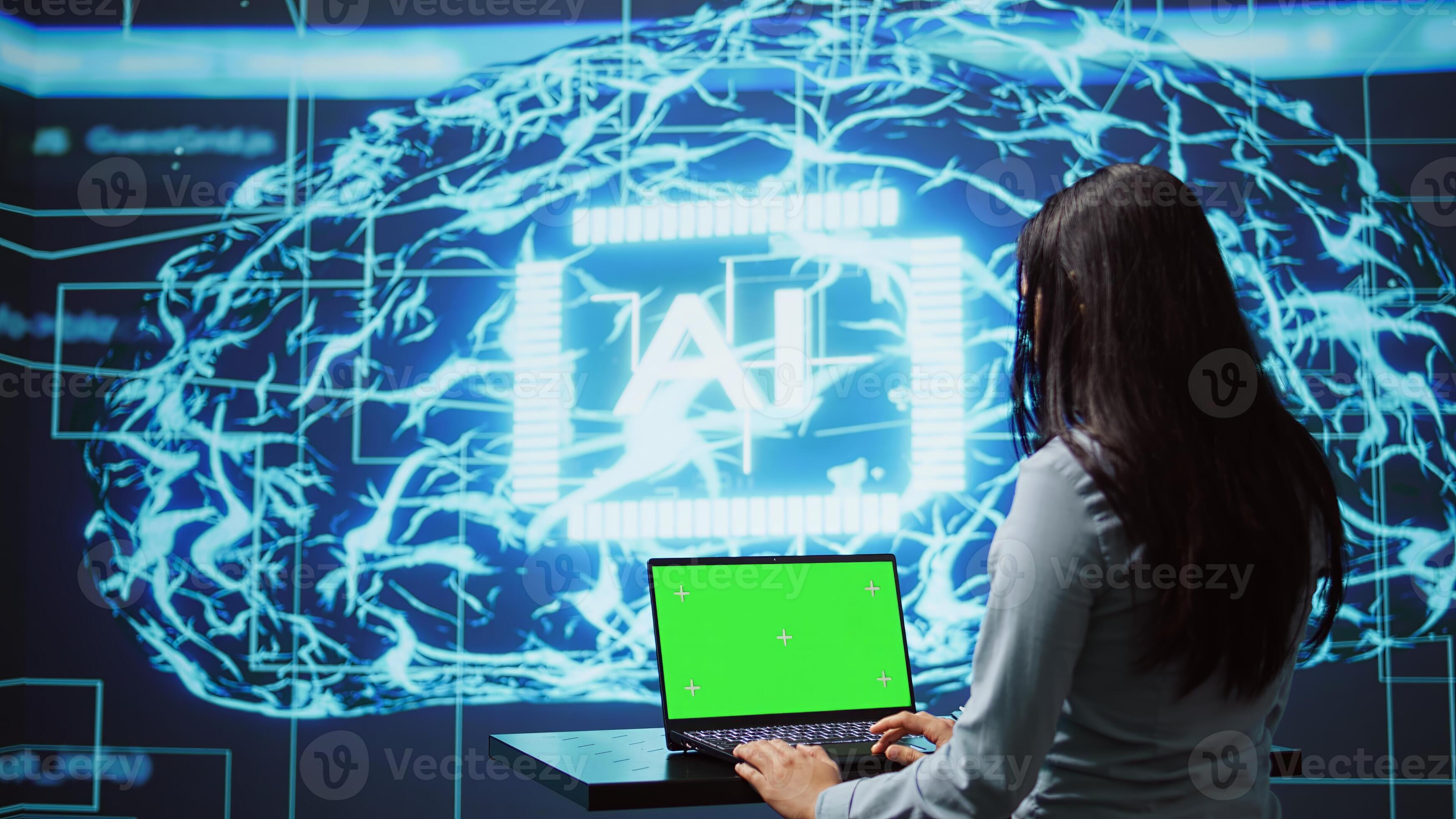 IT specialist using green screen laptop and AI technology for business ...