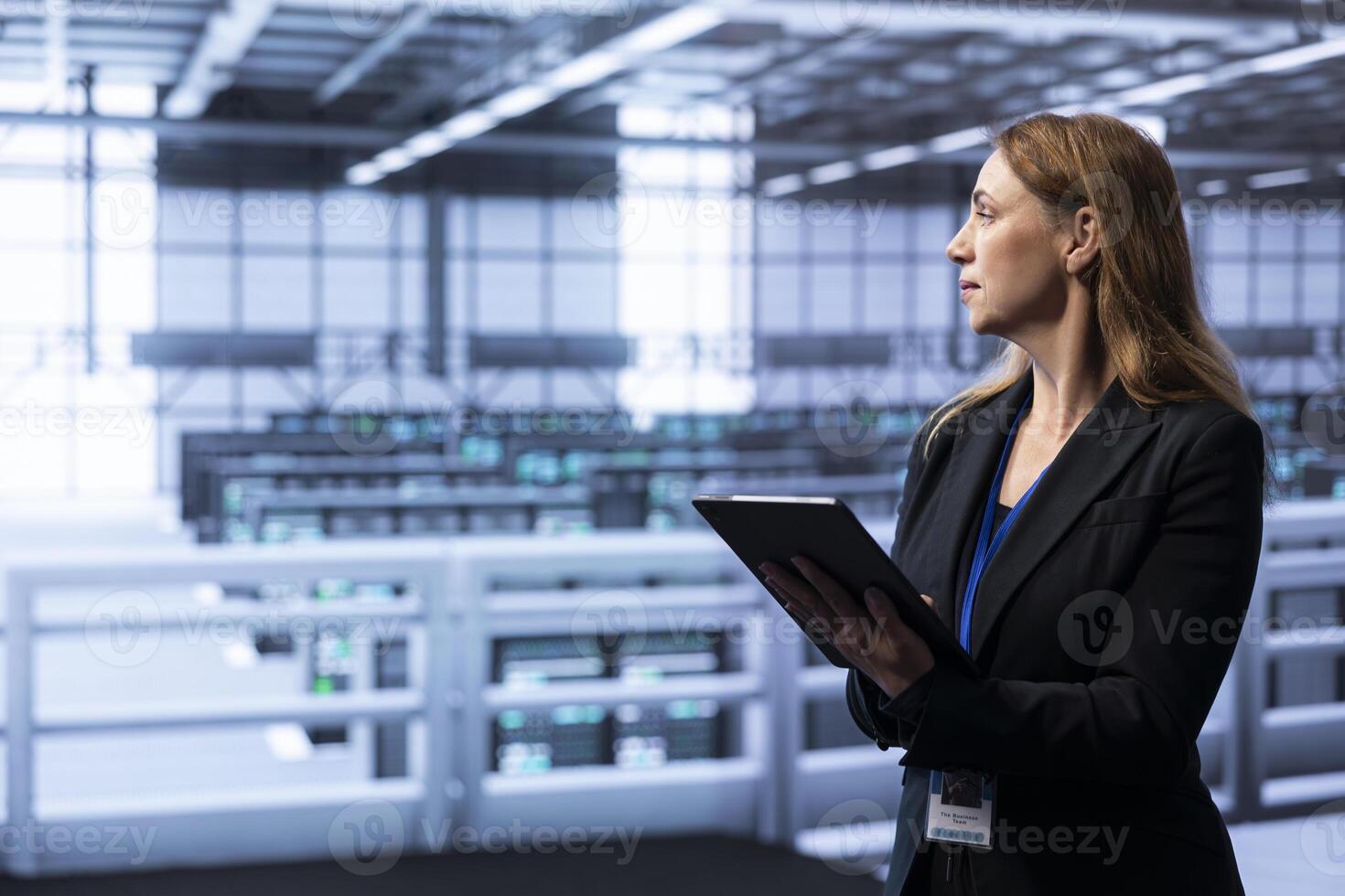Computer Scientist Walking Between Server Rows In Data Center Doing Yearly Infrastructure