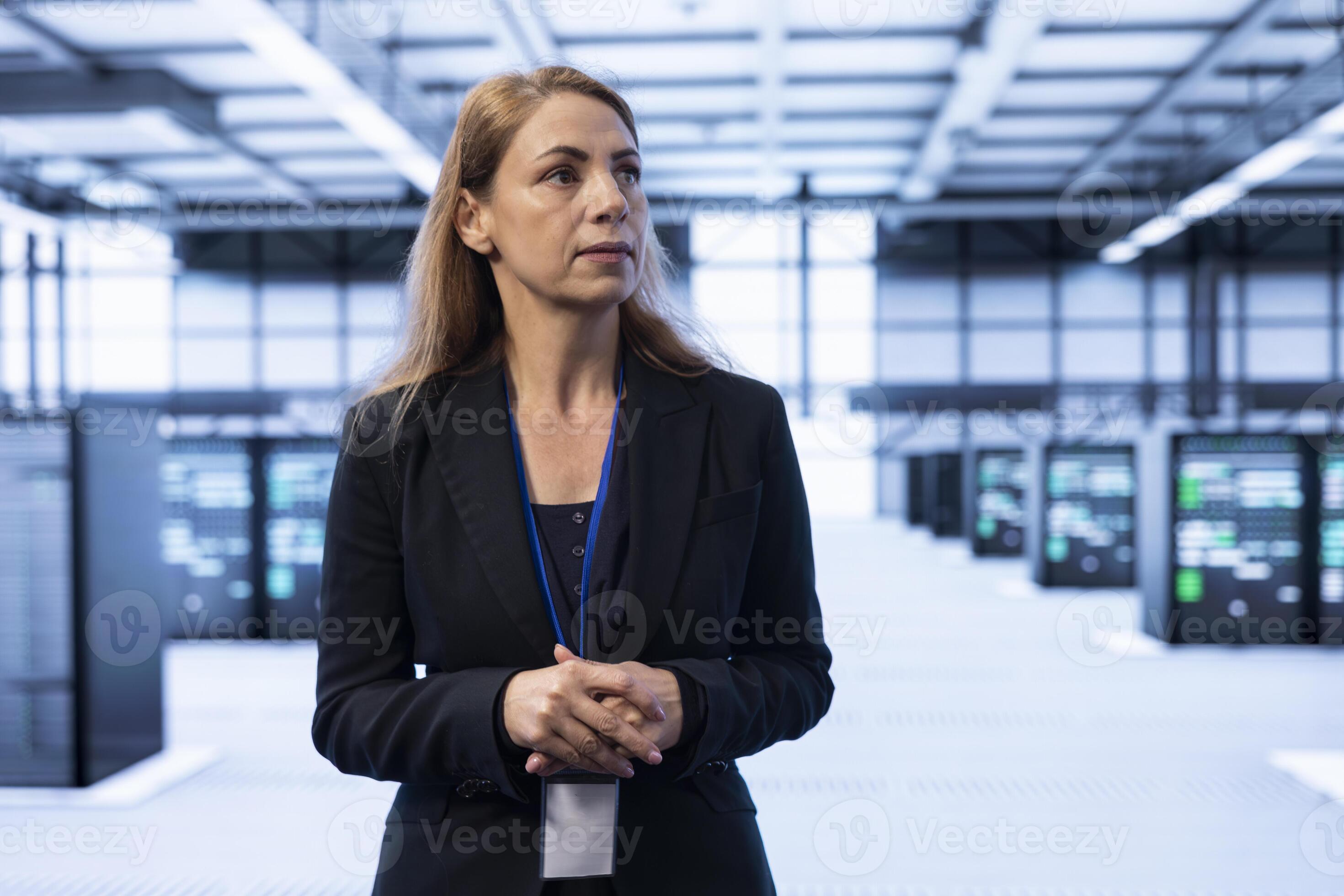 It Staff Member Walking Between Server Rows In Data Center Doing Yearly Infrastructure