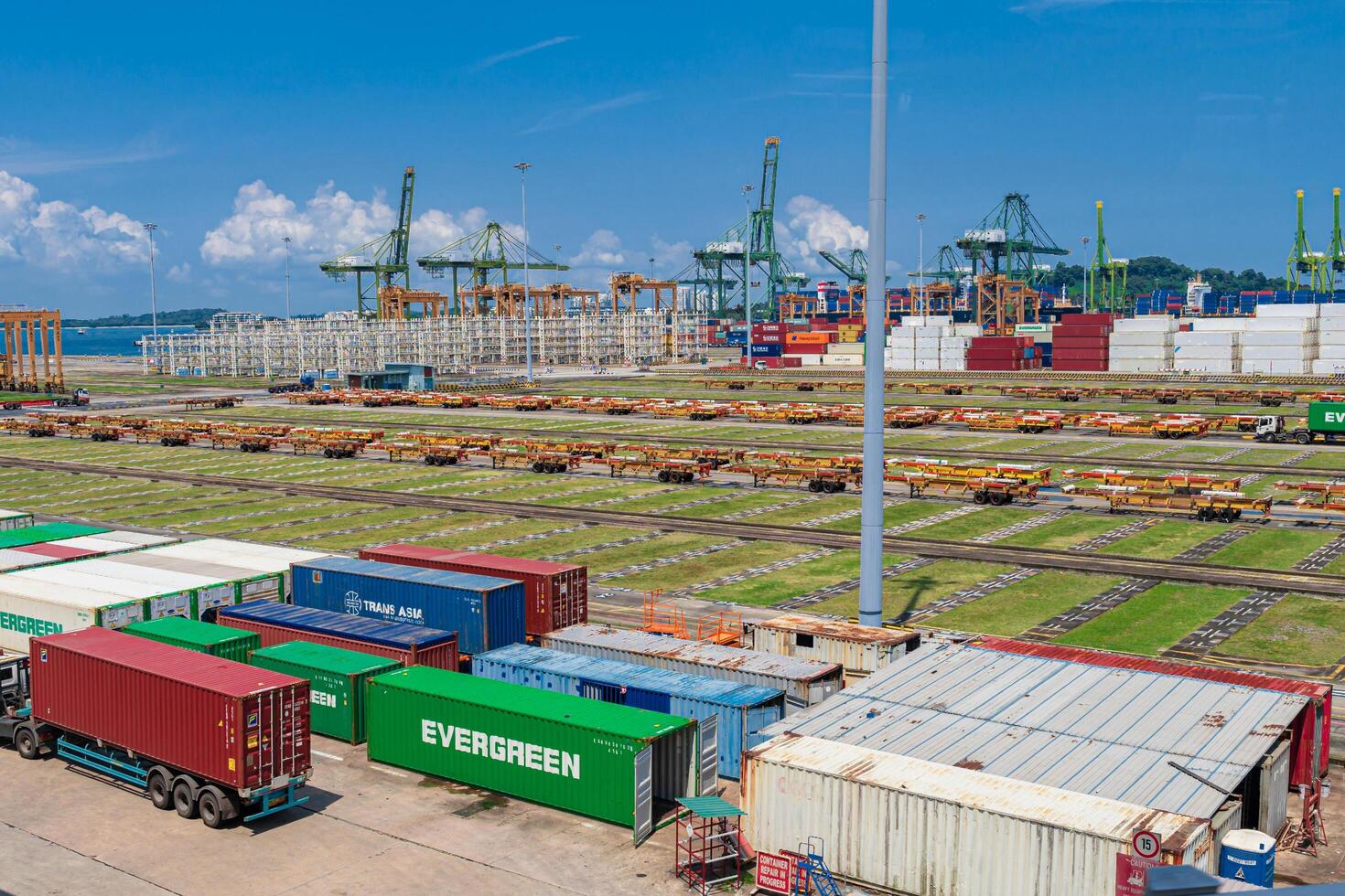 Singapore - Jun 13 2024 Aerial view of container terminal, cranes and ... Singapore - Jun 13 2024 Aerial view of container terminal, cranes and ...