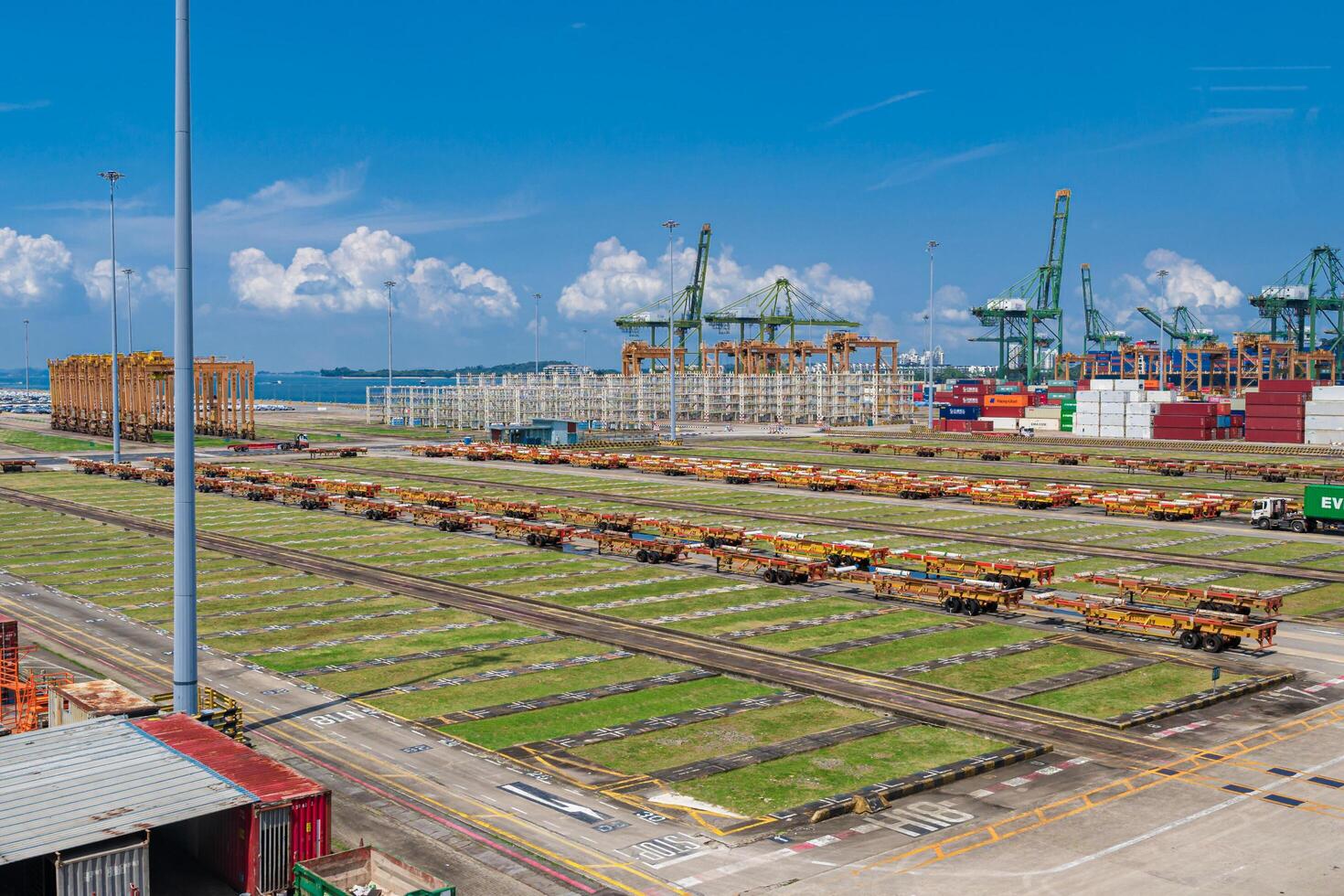 Singapore - Jun 13 2024 Aerial view of container terminal, cranes and ... Singapore - Jun 13 2024 Aerial view of container terminal, cranes and ...