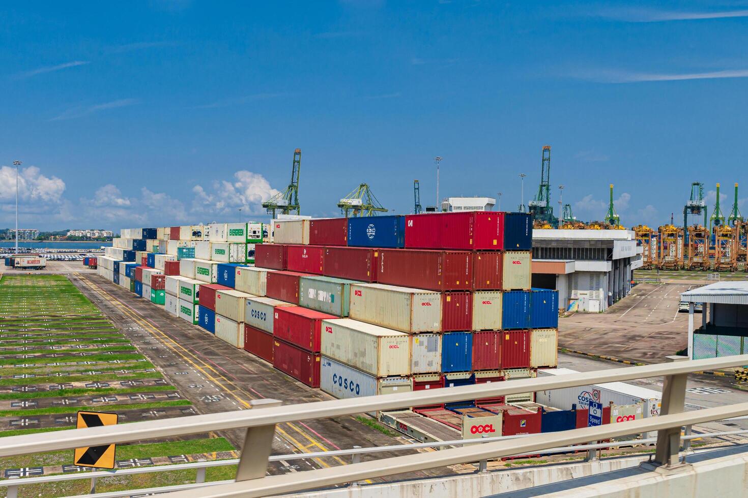 Singapore - Jun 13 2024 Aerial view of container terminal, cranes and ... Singapore - Jun 13 2024 Aerial view of container terminal, cranes and ...