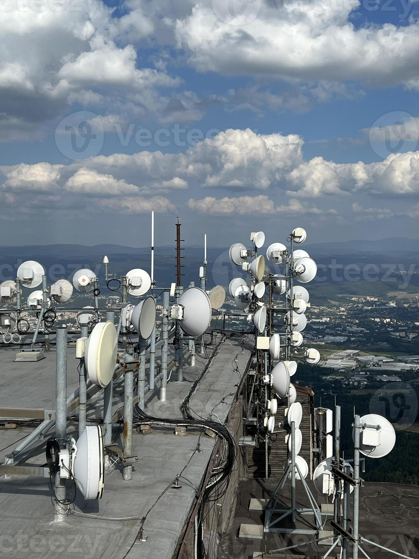 Radio transmitting center with many Radio link Stations microwave is located in peak mountains ...