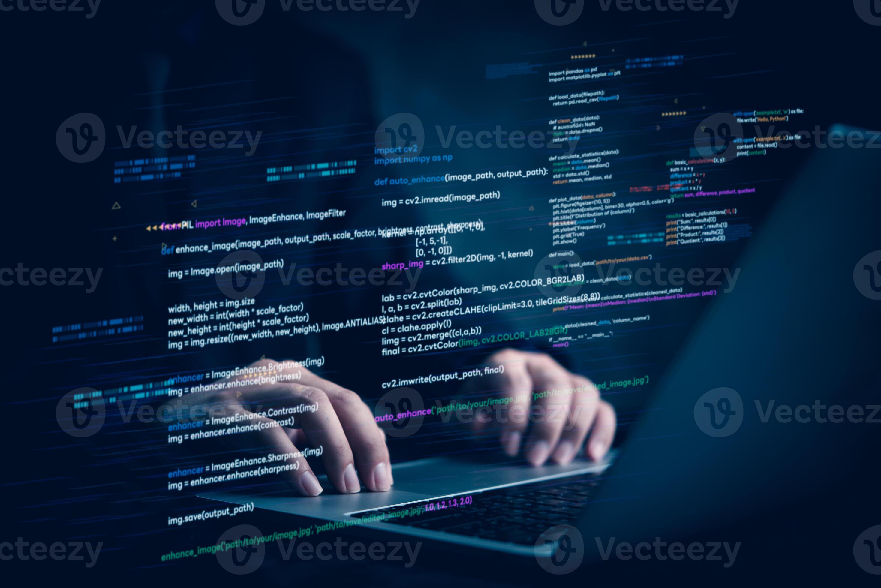 Hands typing on laptop with programming code on screen, representing software development ...