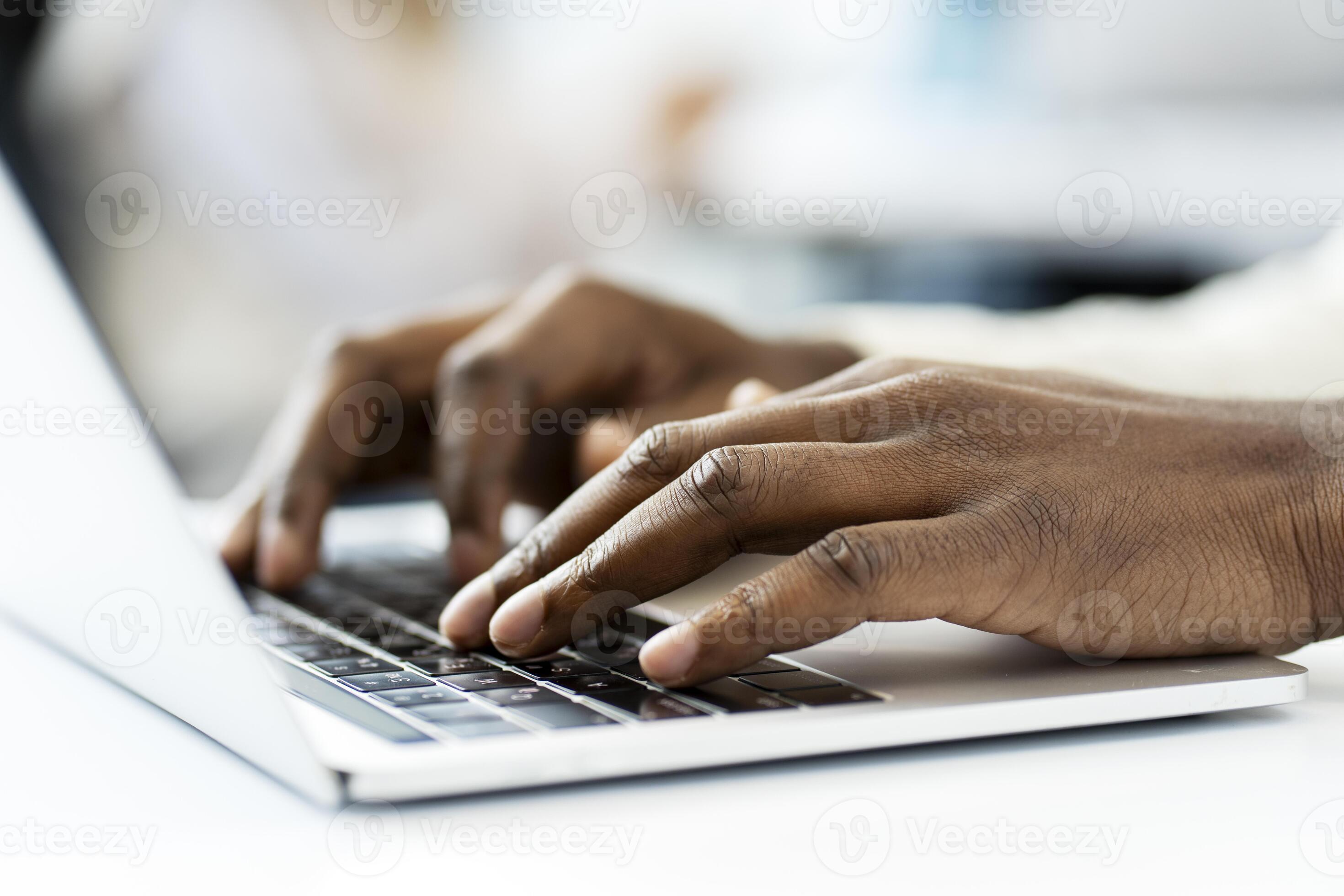 African American programmer writing code on laptop keyboard at workplace 50688508 Stock Photo at ...