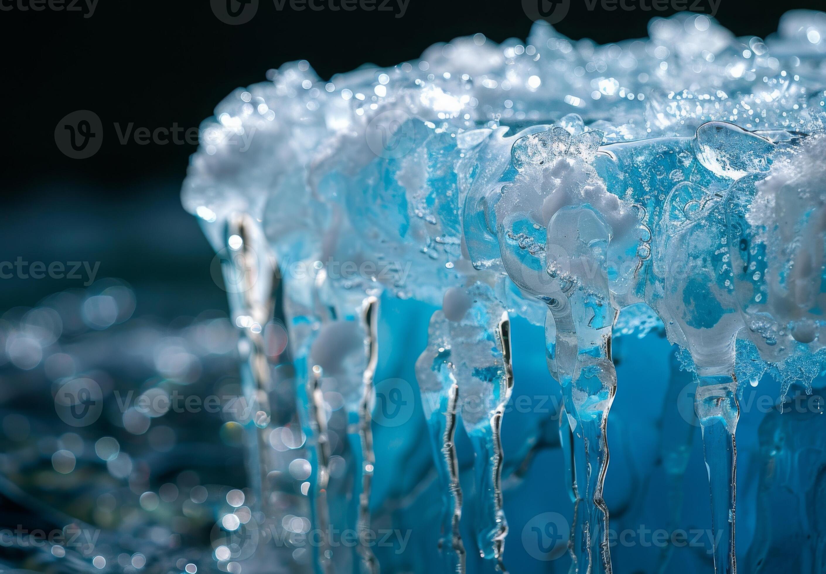 A close up of a melting glacier with clear water dripping down its surface 50690053 Stock Photo ...