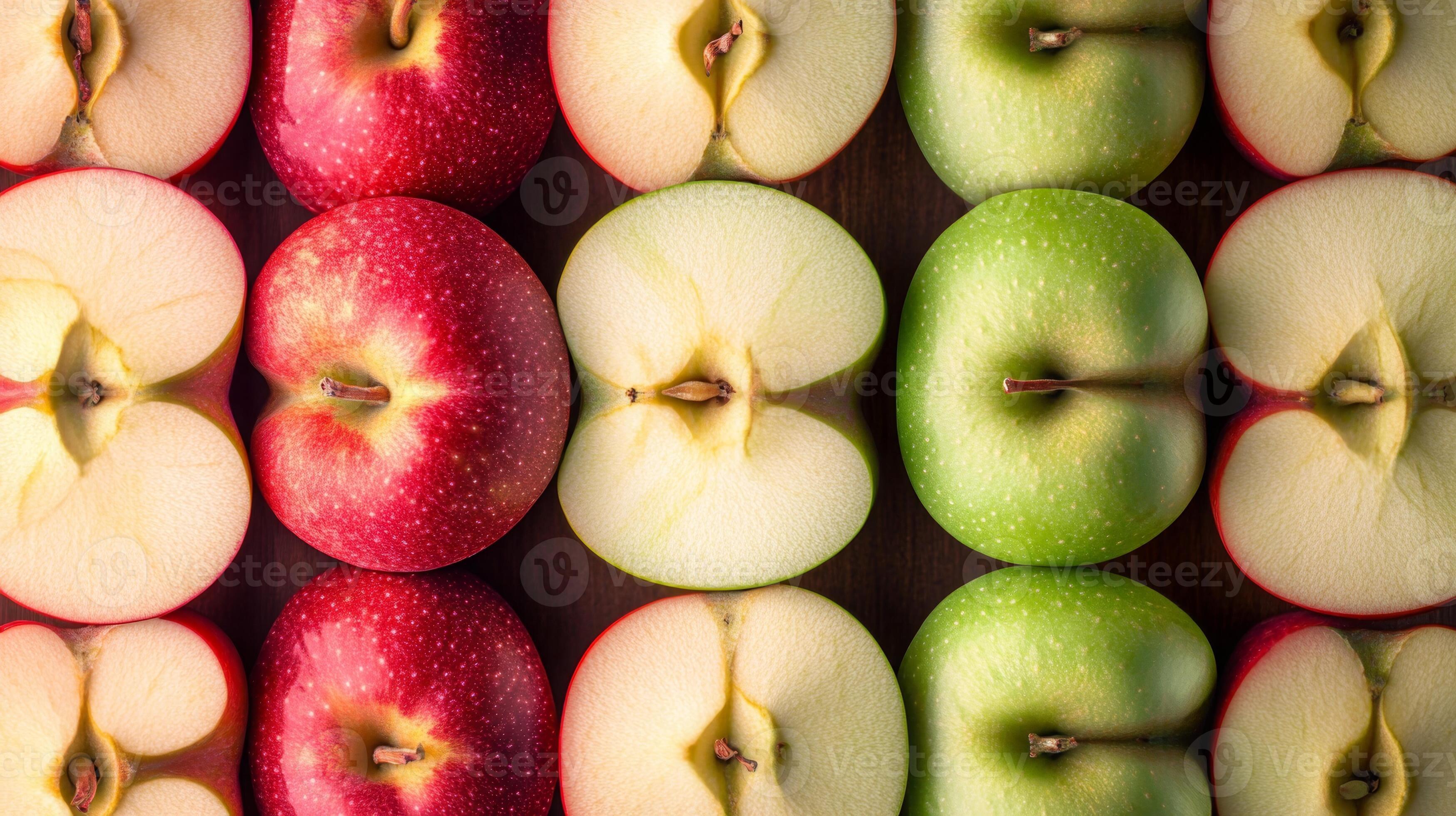 Closeup of rows of fresh apple slices, alternating between red and ...