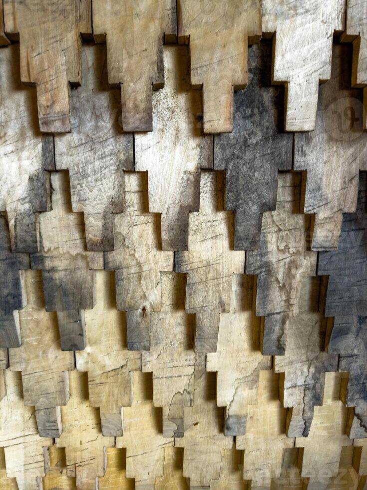 A detailed close-up view of interlocking wooden blocks forming a ...