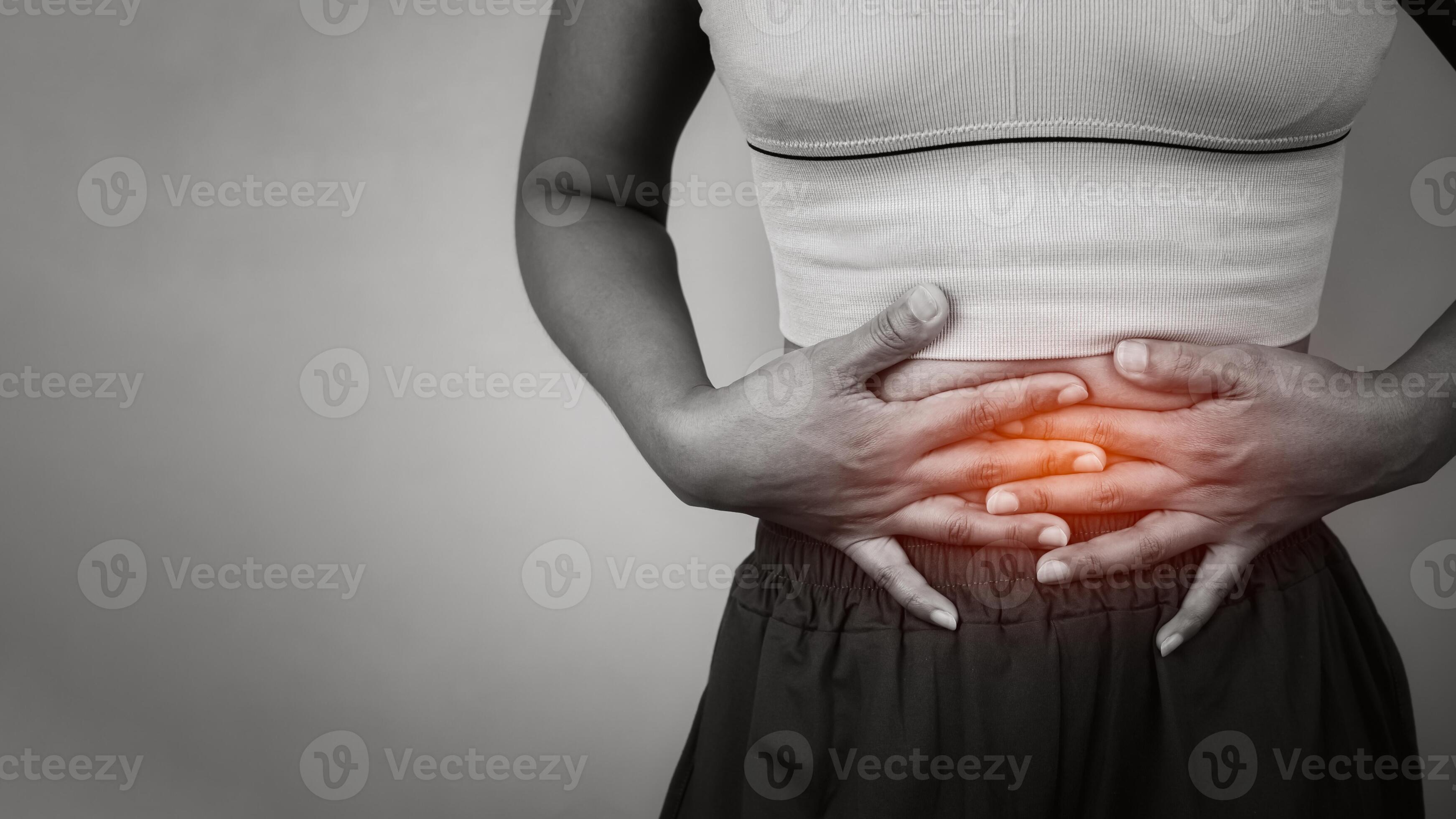 Woman hands on stomach painful suffering from stomachache, Symptom of sickness. Stress ...
