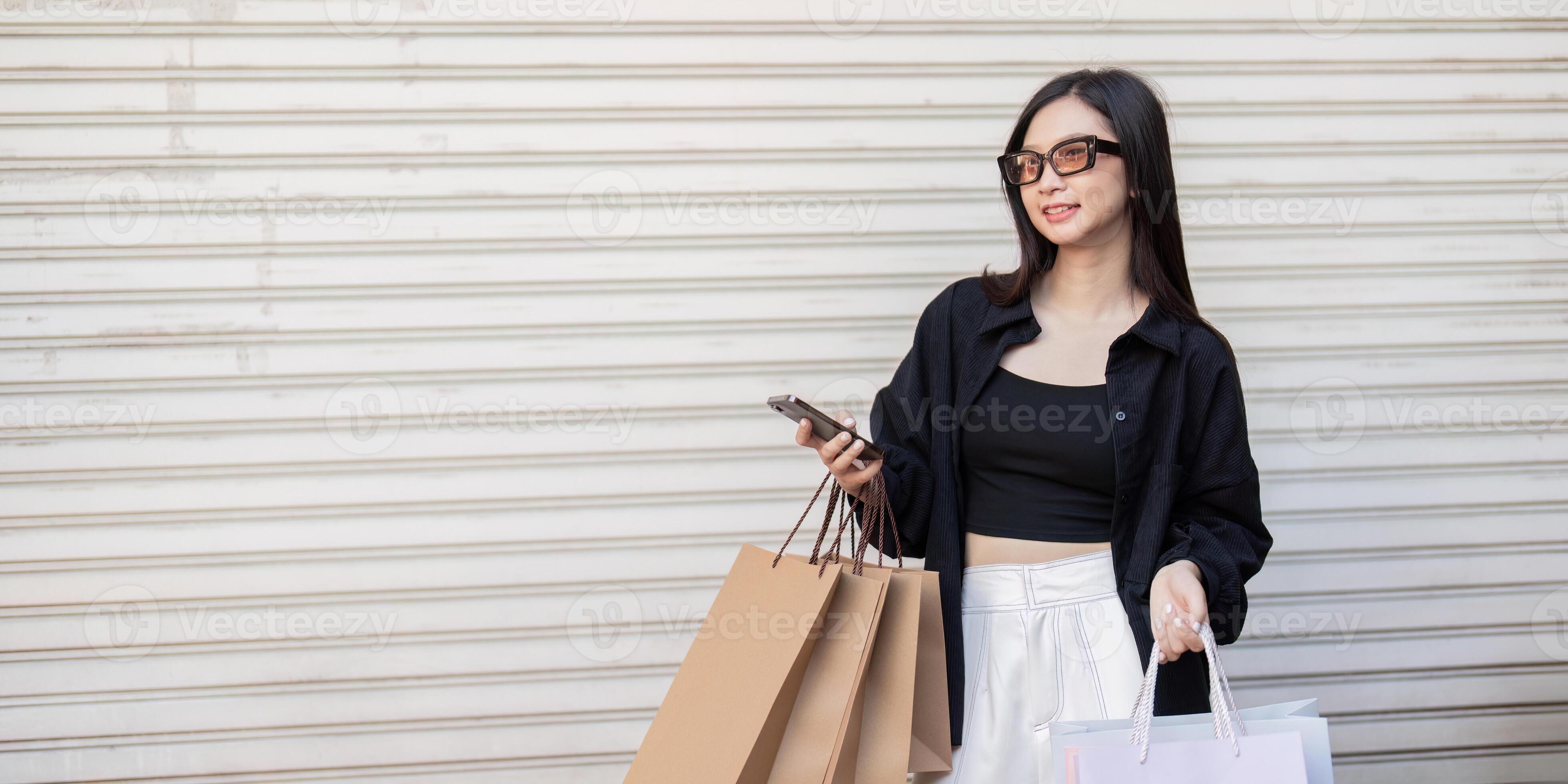 Trendy Woman Enjoys Shopping Spree on Black Friday with Multiple Bags 51166447 Stock Photo at ...