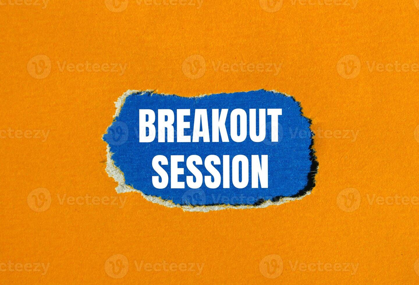 Breakout session message written on ripped torn orange paper with blue ... Breakout session message written on ripped torn orange paper with blue ...