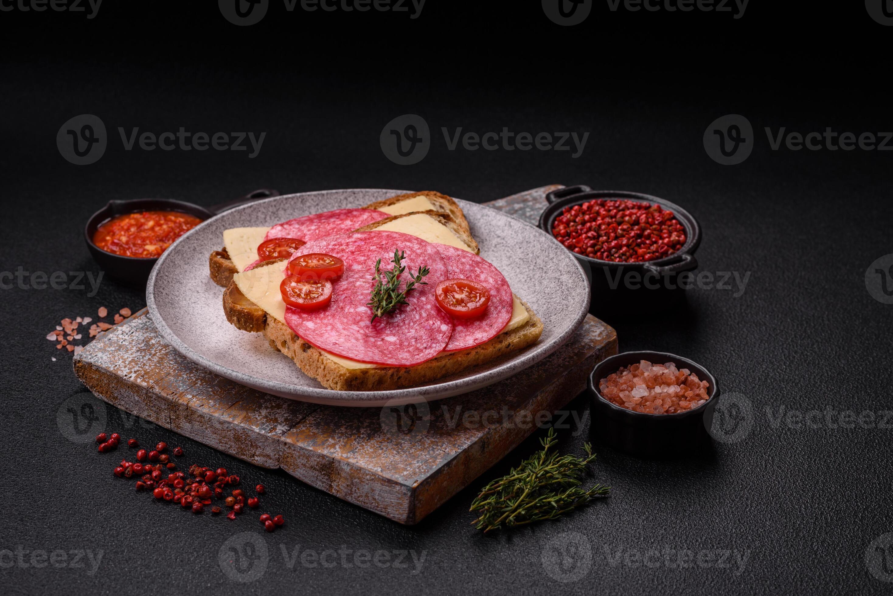 Sandwich with toast, salami slices, cheese and tomatoes, salt and spices 51175716 Stock Photo at ...