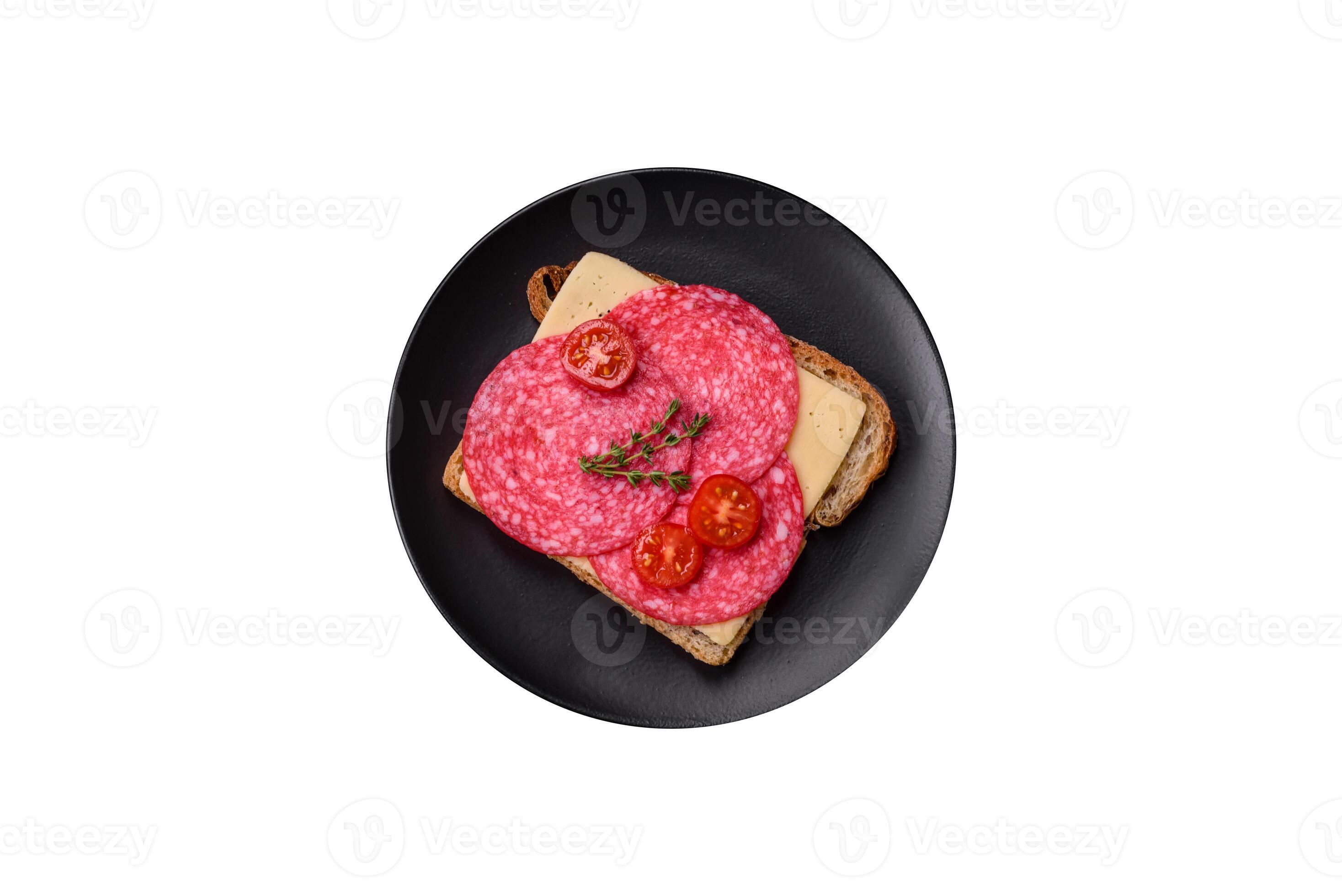 Sandwich with toast, salami slices, cheese and tomatoes, salt and spices 51175794 Stock Photo at ...