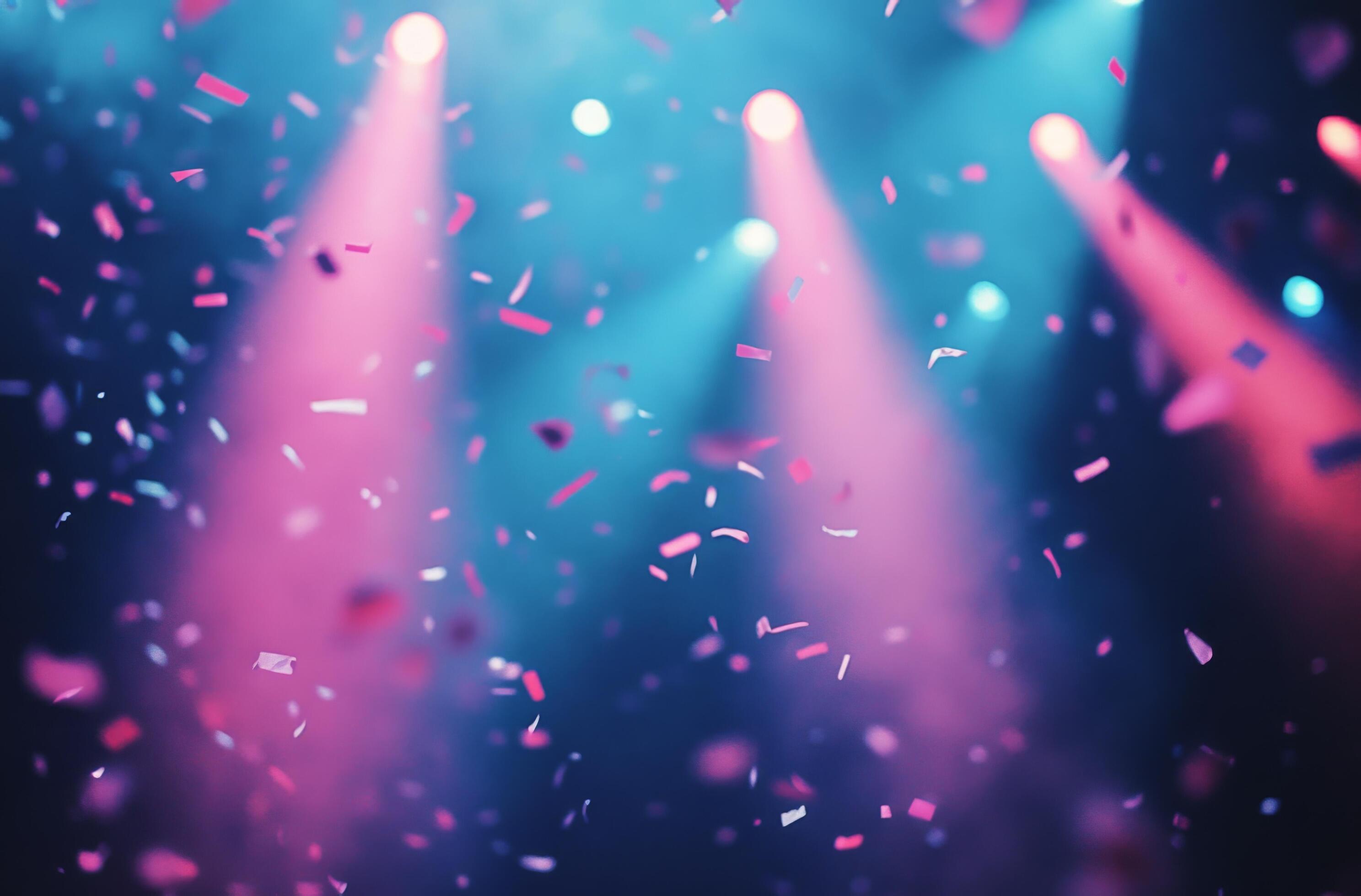 Colorful confetti shower under vibrant stage lights during a lively celebration 51247837 Stock ...