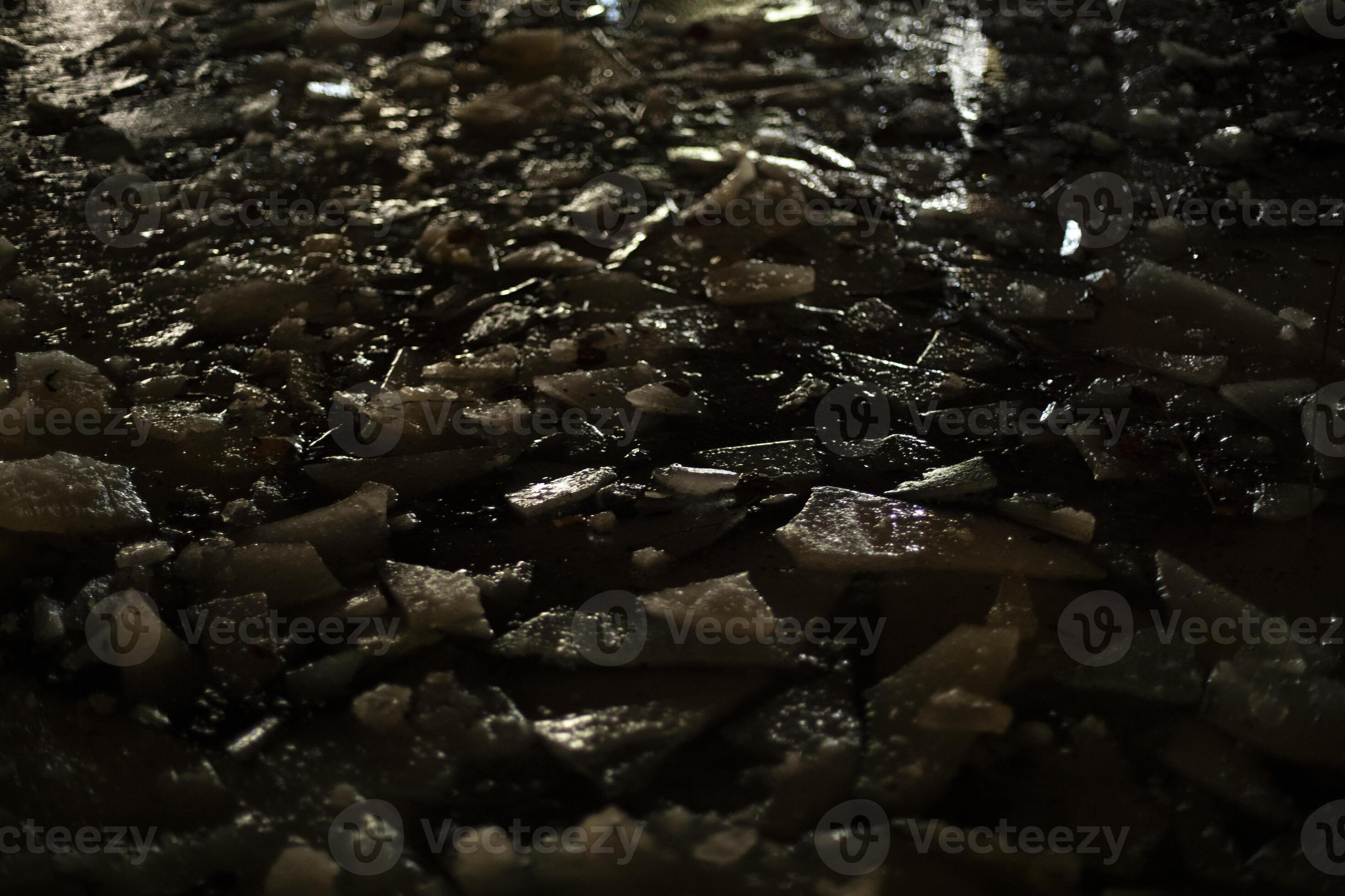 Texture of ice in dark. Broken ice. Puddle at night. 51452099 Stock Photo at Vecteezy