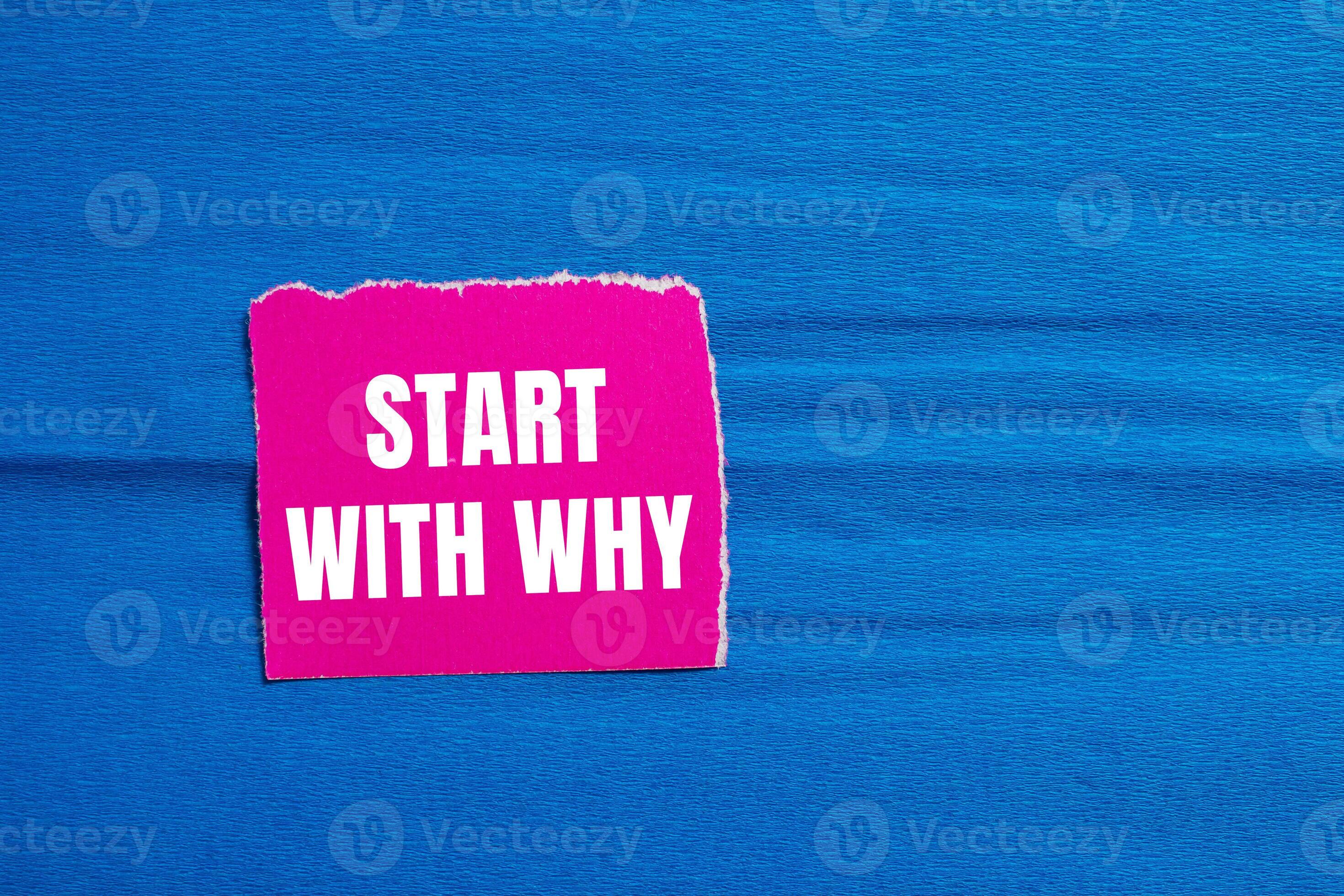Start with why message written on ripped pink torn paper piece with blue background. Conceptual ...