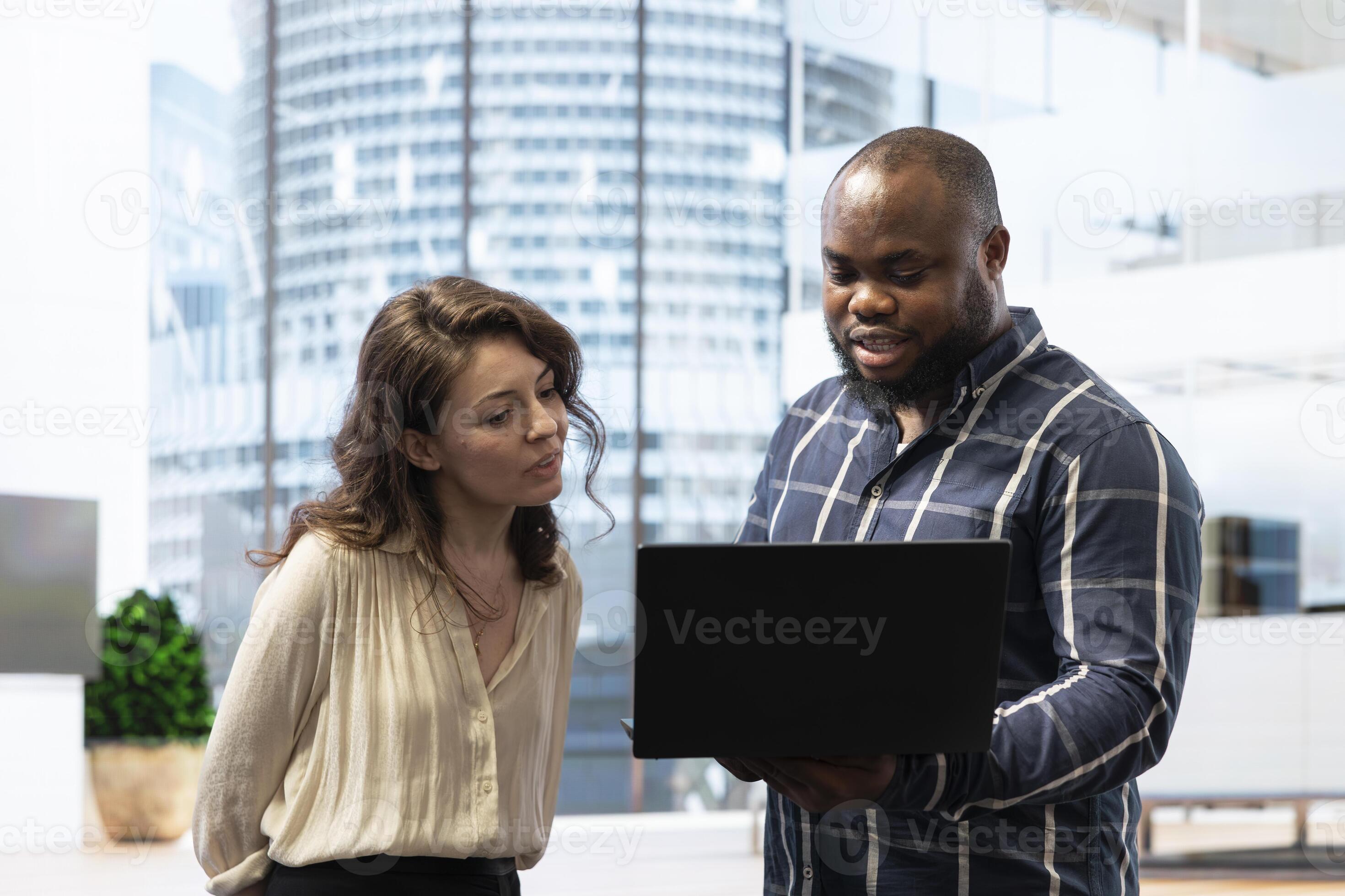 Clients And Realtor On An Office Tour Evaluating Modern Workspace