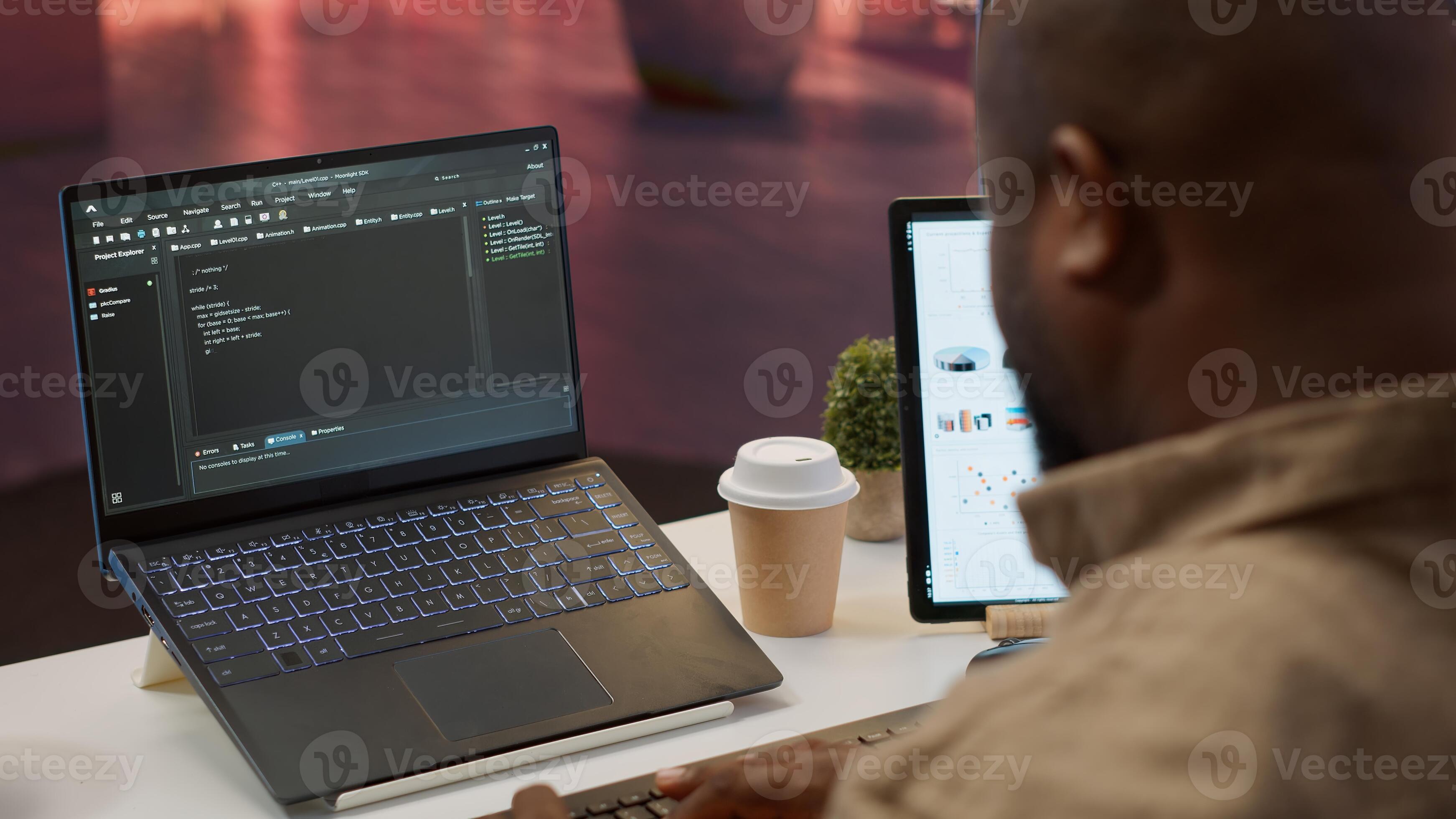 AI software developer creating an algorithm for deep learning and data mining, coding on his ...
